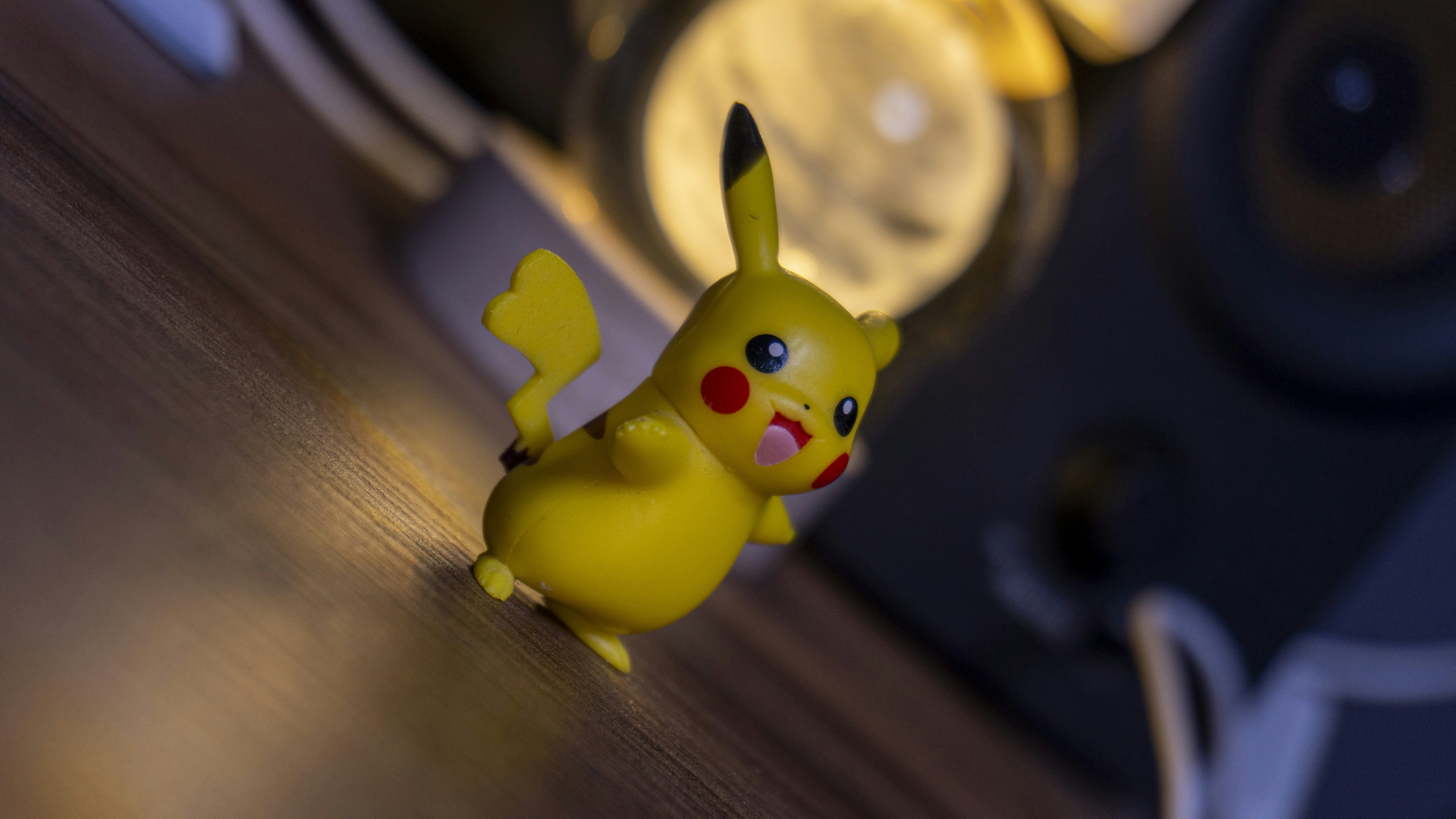 Pikachu figurine is on a table. photo – Free Wallpaper Image on Unsplash