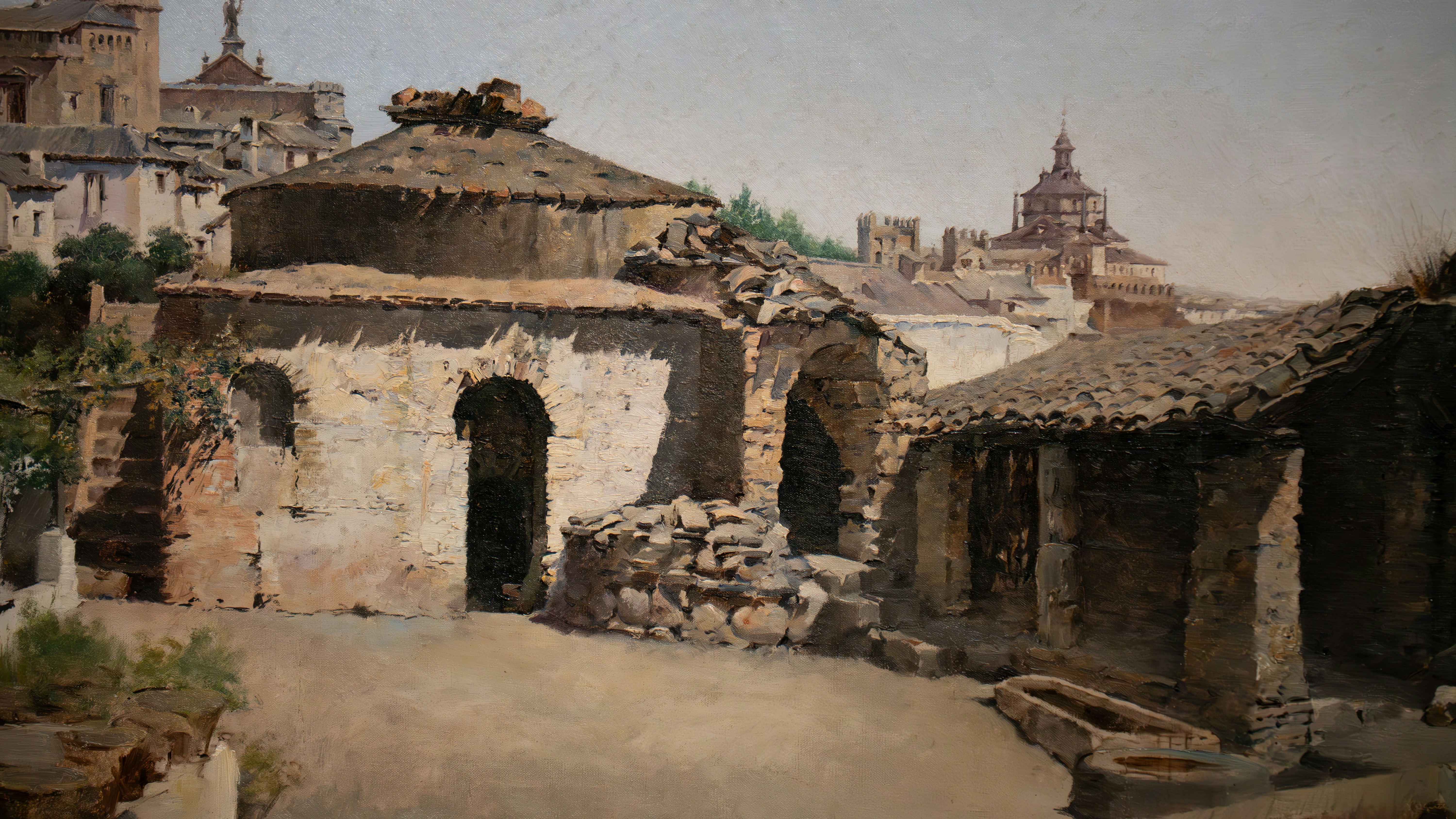 Ruined structures dominate a historic, old town.