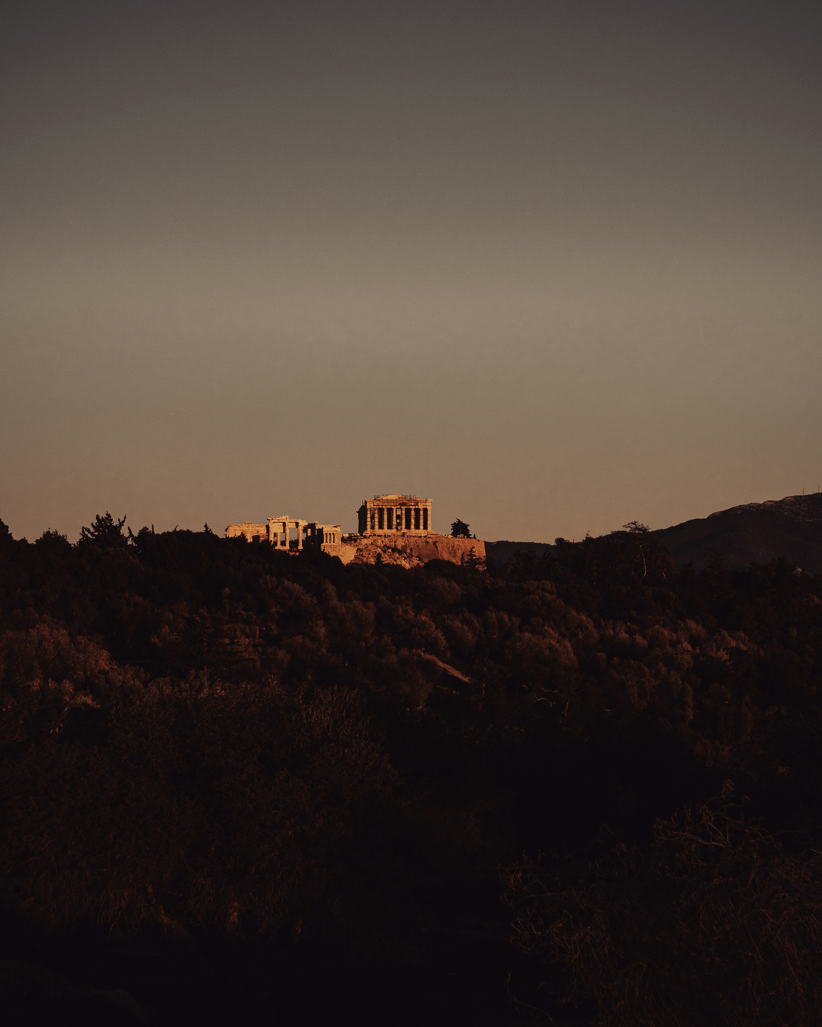 Dusk Temple on the Hill: A Quiet Beacon Over the Forest