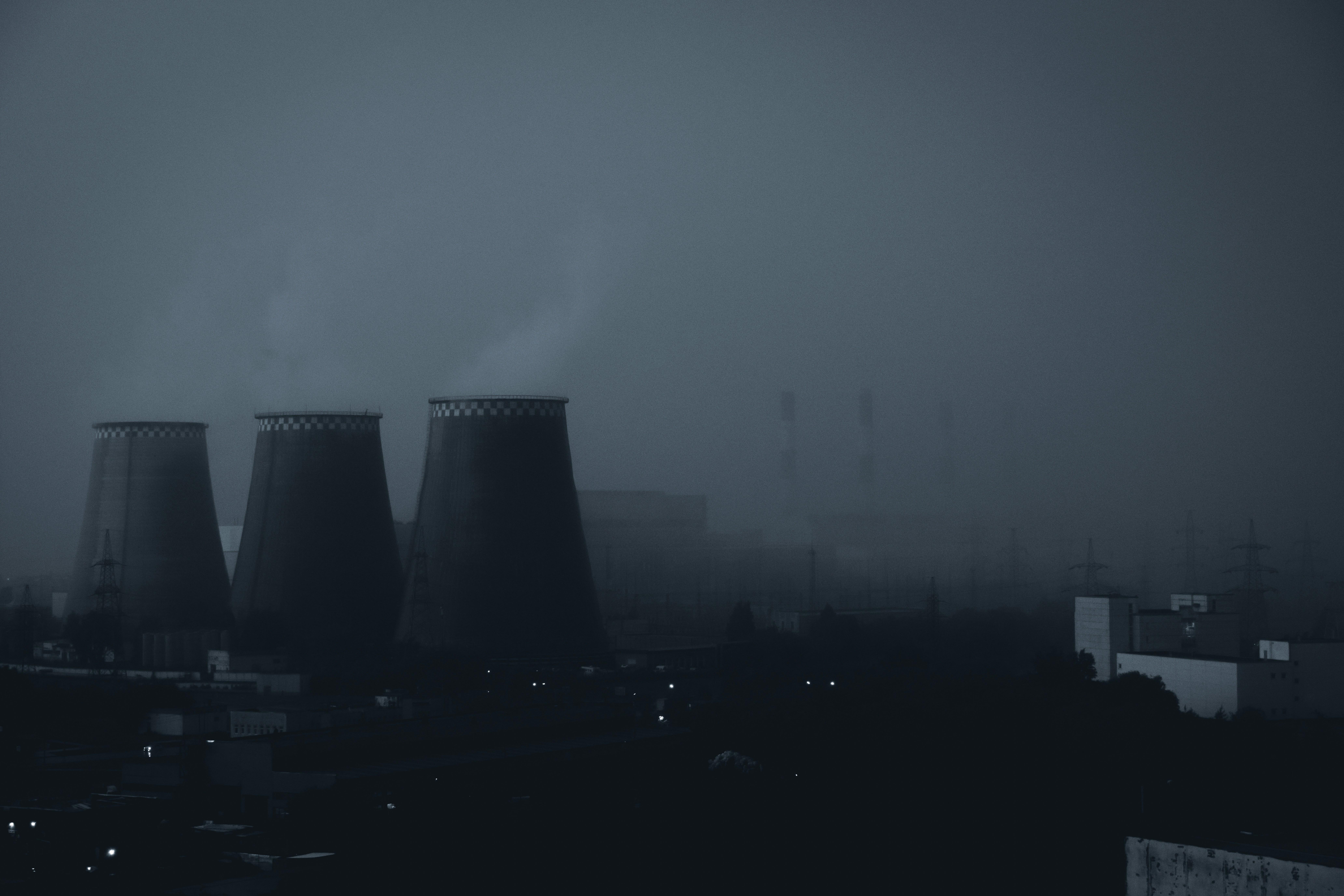 Veil of Industry: A Monochrome Reflection