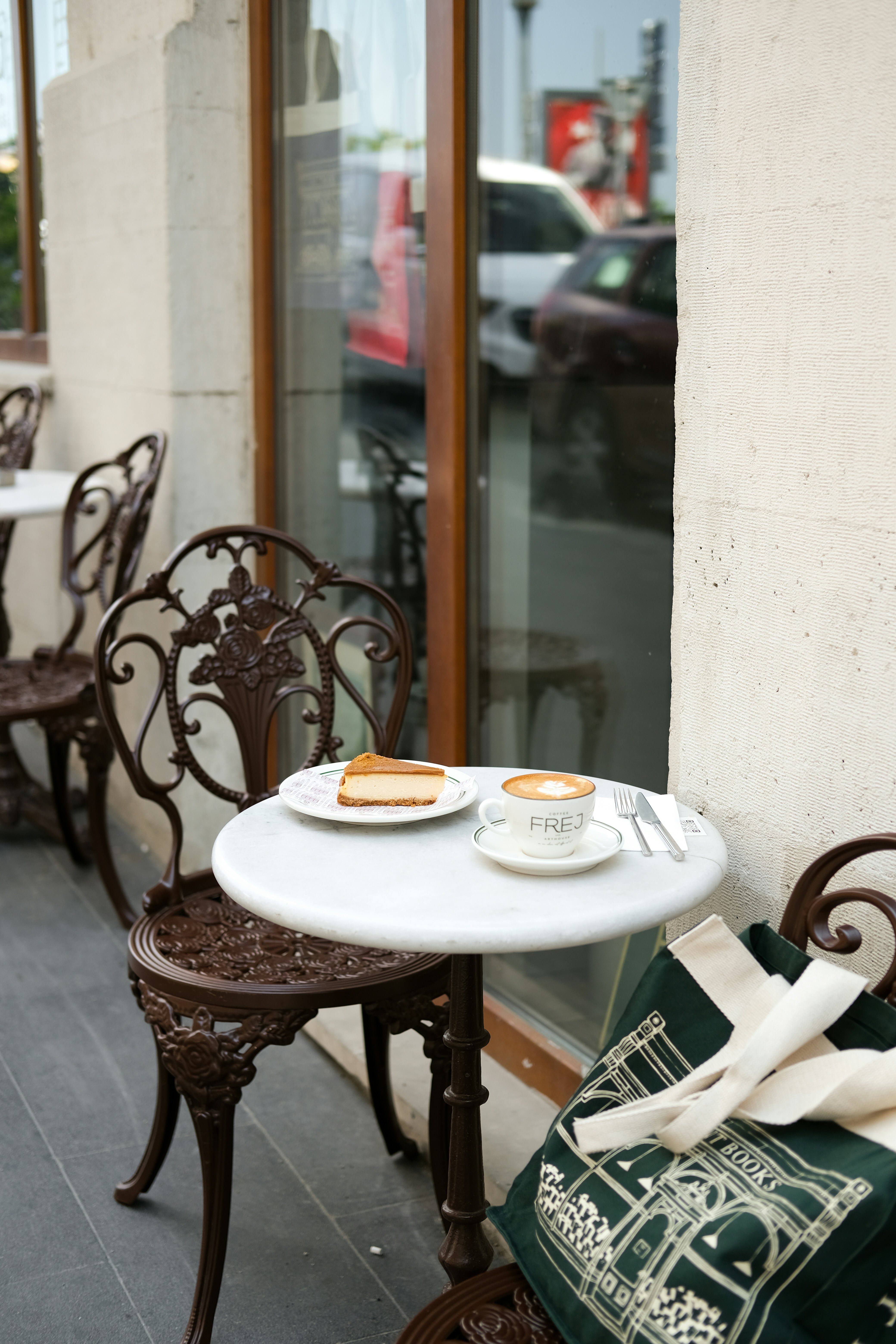 Espresso on Marble: Morning Quiet at a Wrought-Iron Café Table