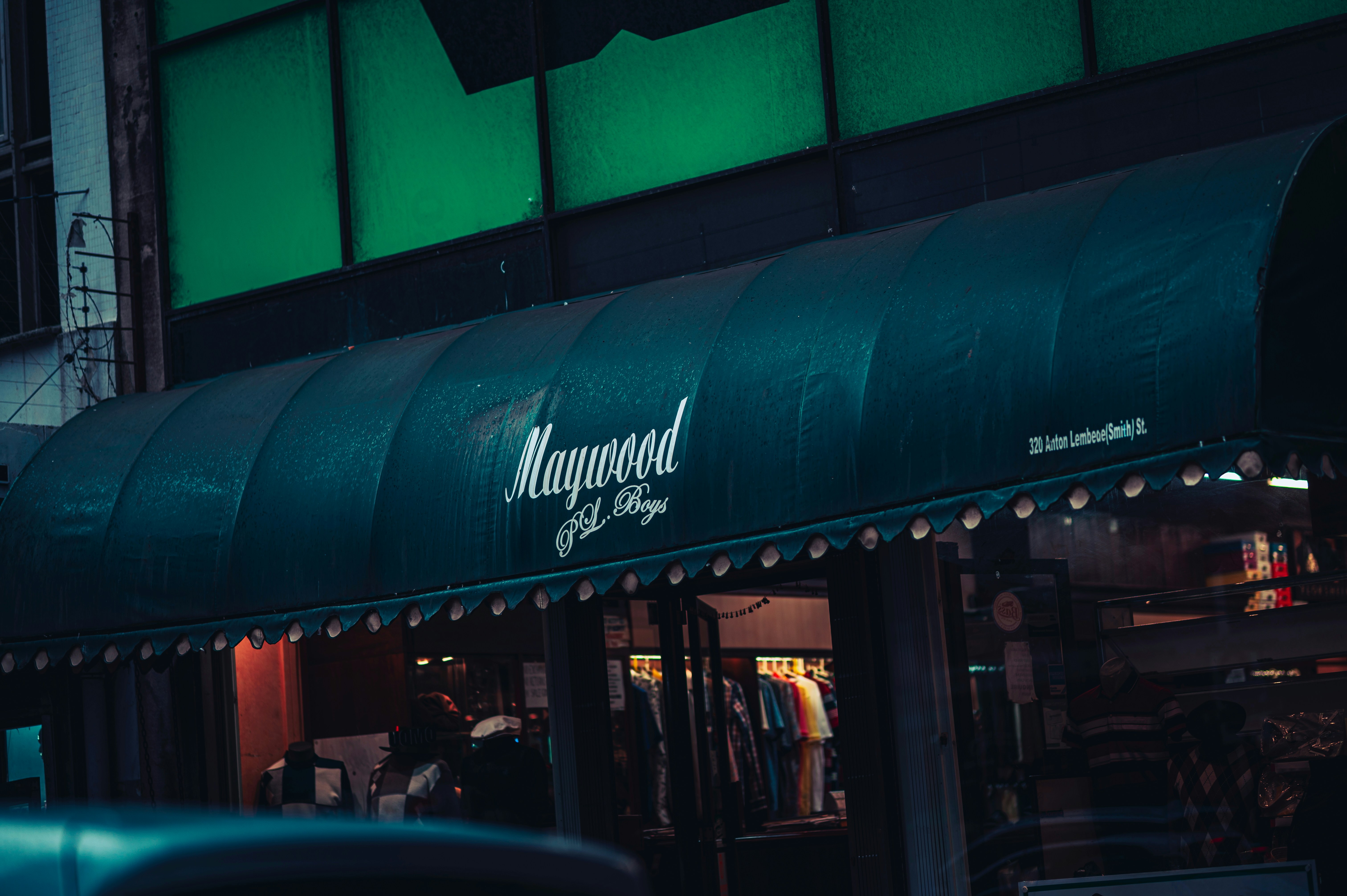 Maywood Blind Box: Neon Green Canopy and Urban Storefront
