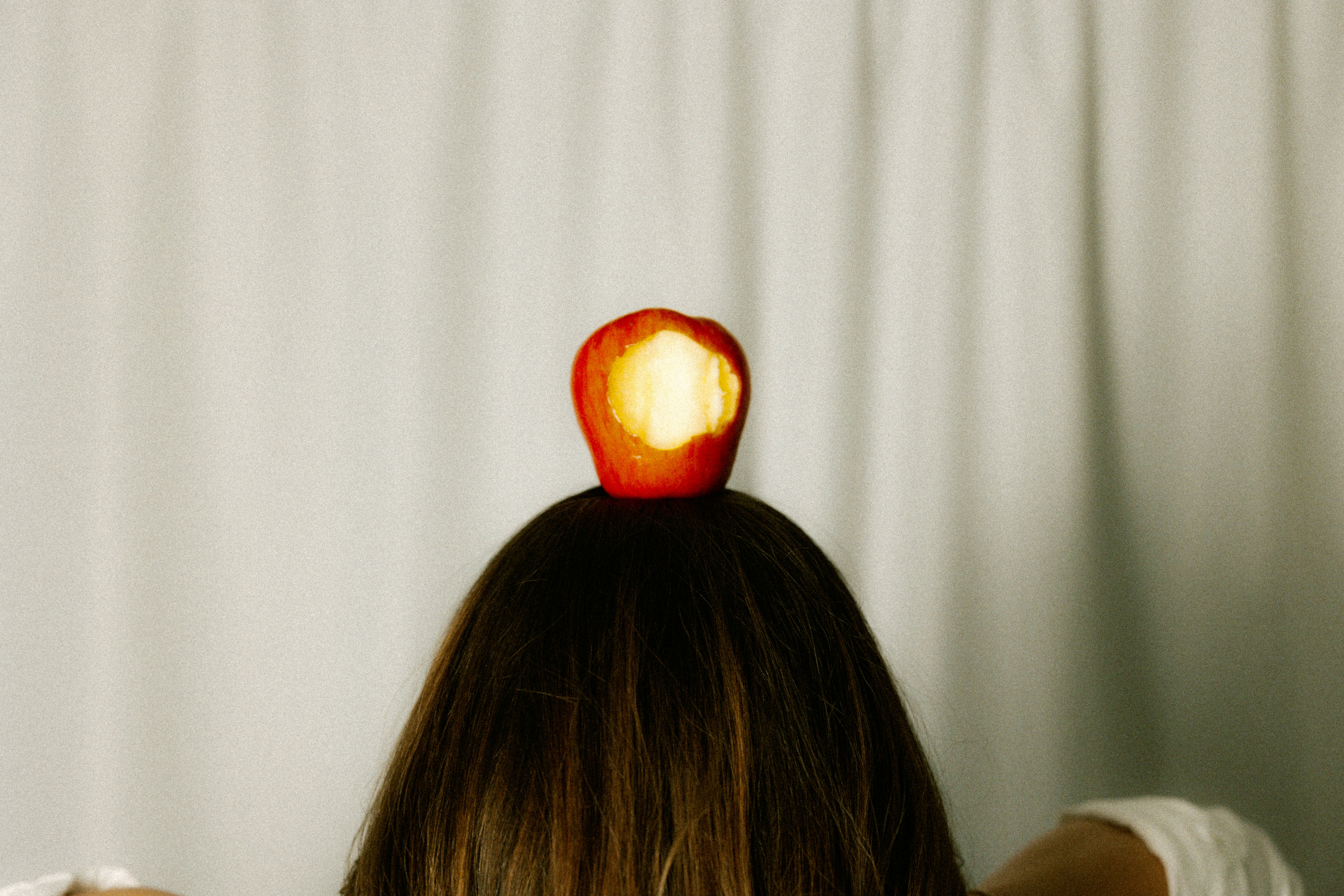 Apple Crown: A Playful Portrait with a Hidden Glow