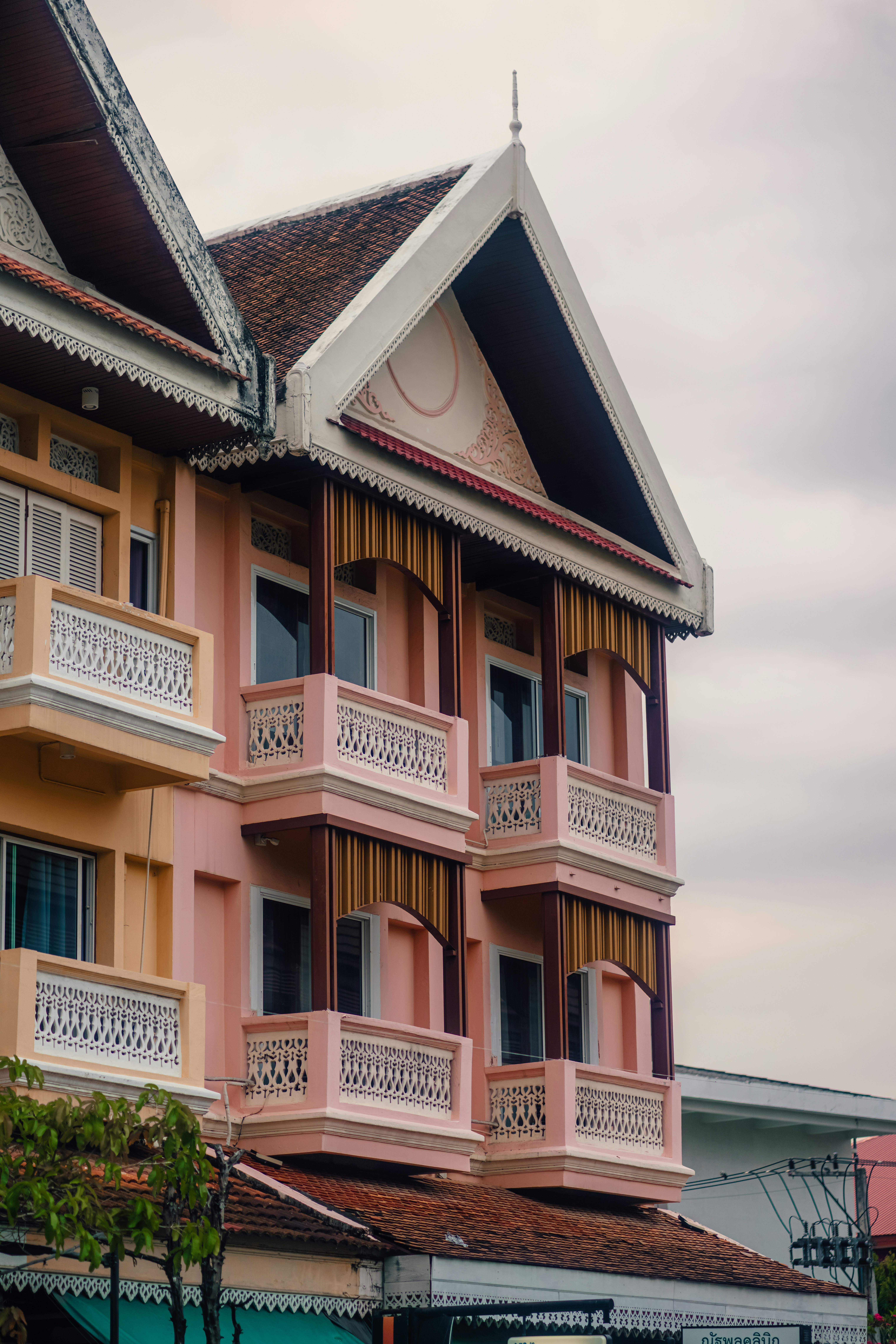 Pastel Veranda Facade: A Rhythmic Tapestry of Balconies