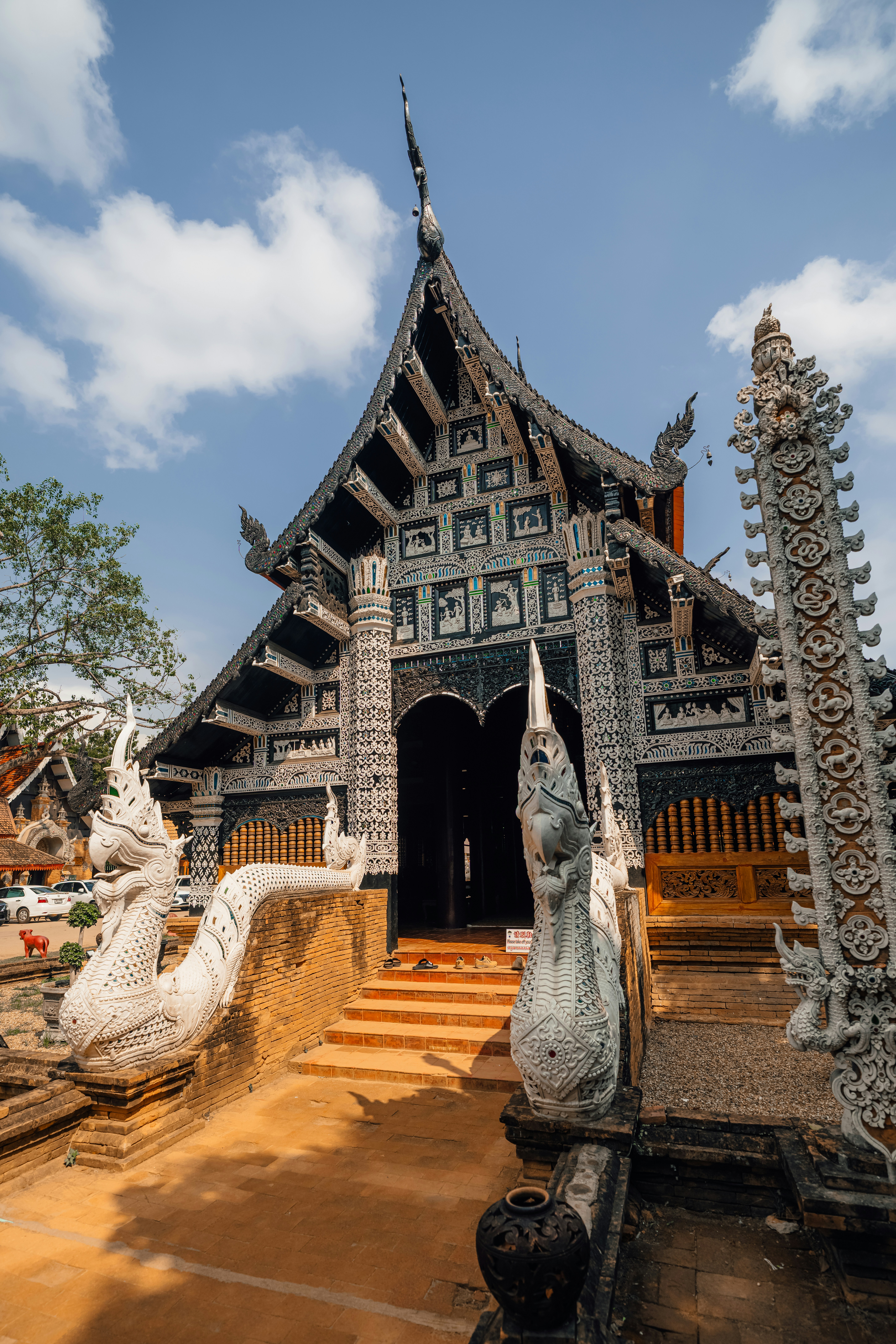 Dragon-Guarded Mosaic Portal: A Temple of Ceramic Facade Under a Bright Sky