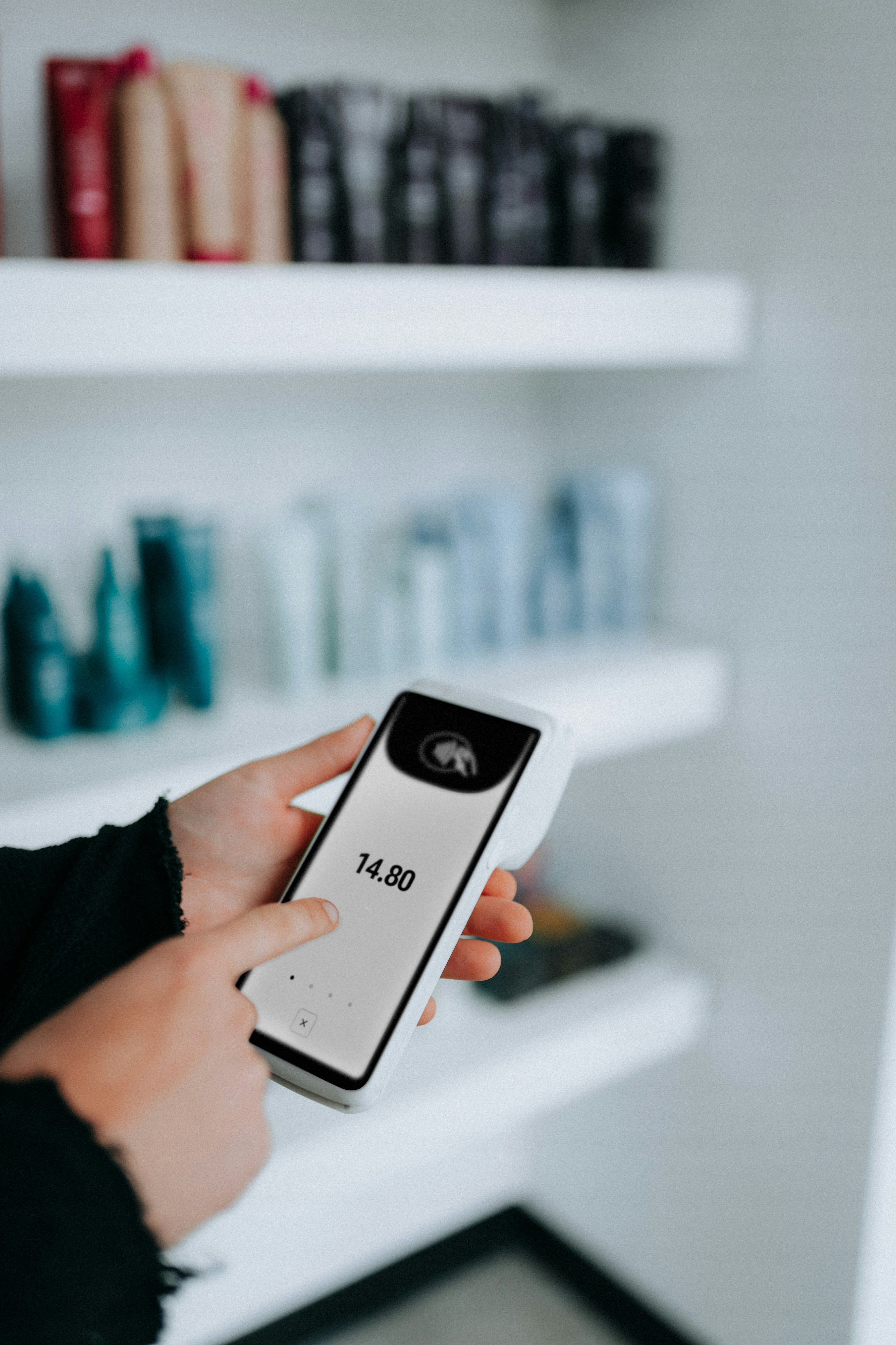 Someone is operating a point-of-sale system. photo – Free Customer ...