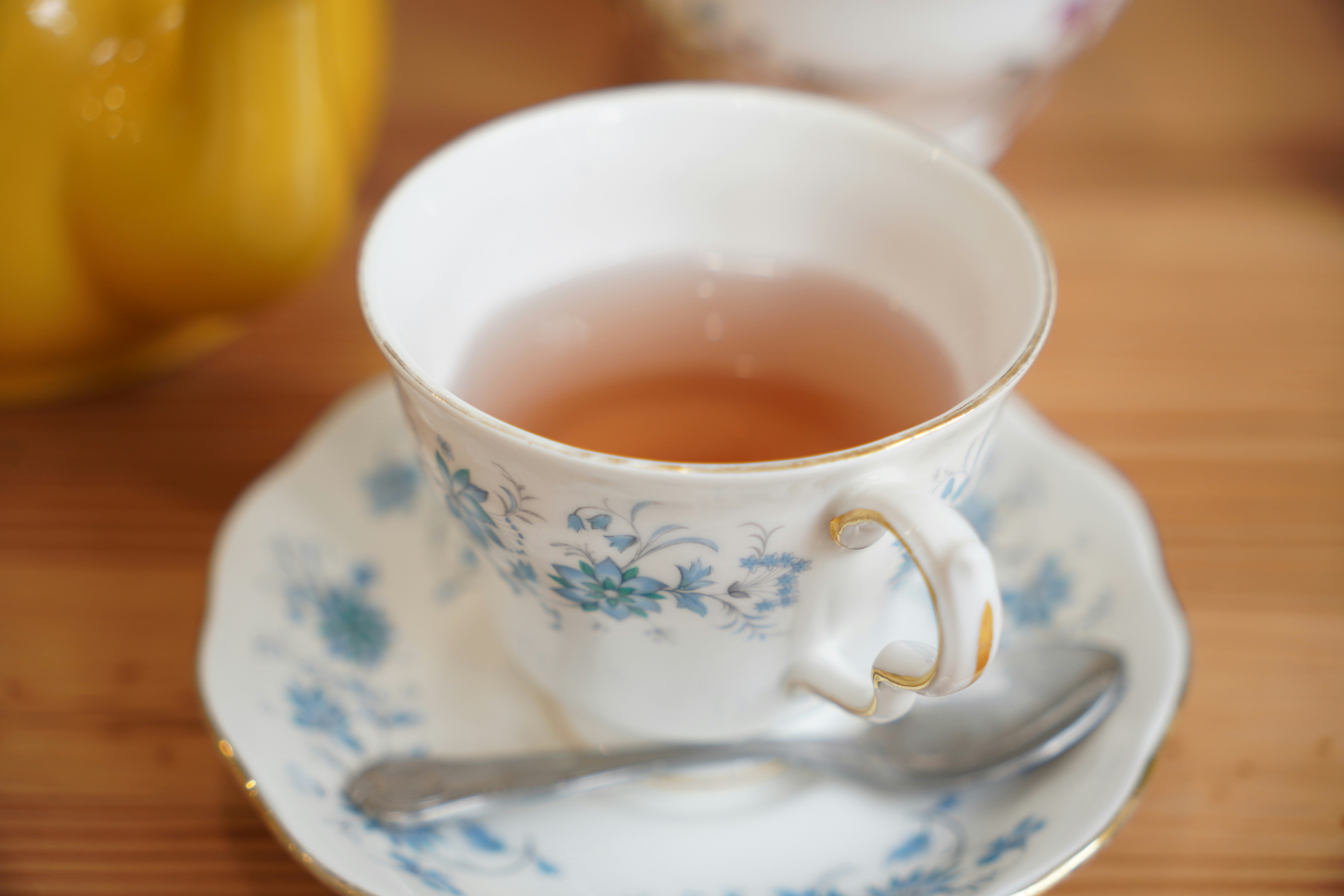 Tea is served in a floral teacup and saucer. photo – Free Tea Image on ...