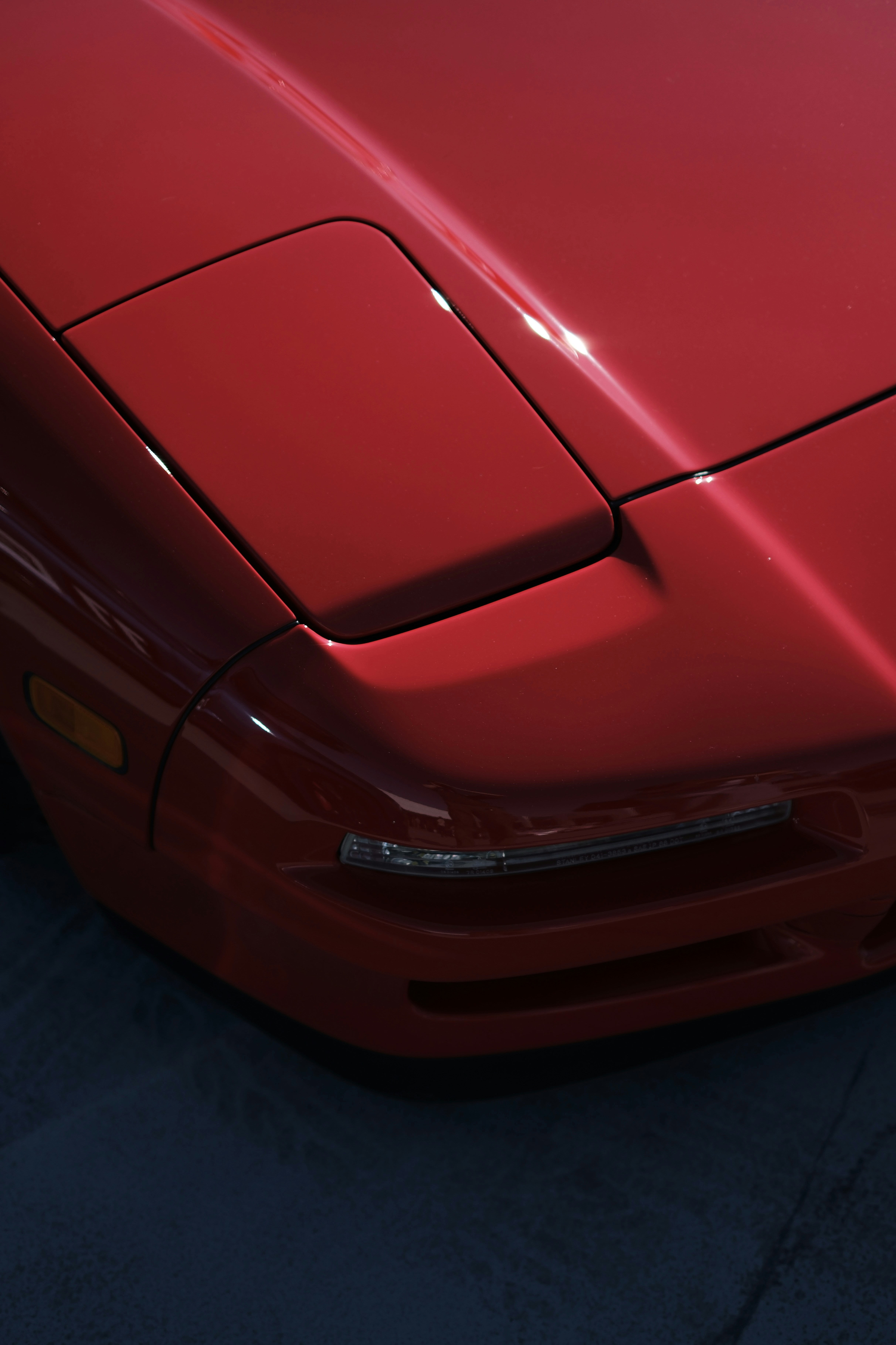 Crimson Curves: A Study in Automotive Elegance