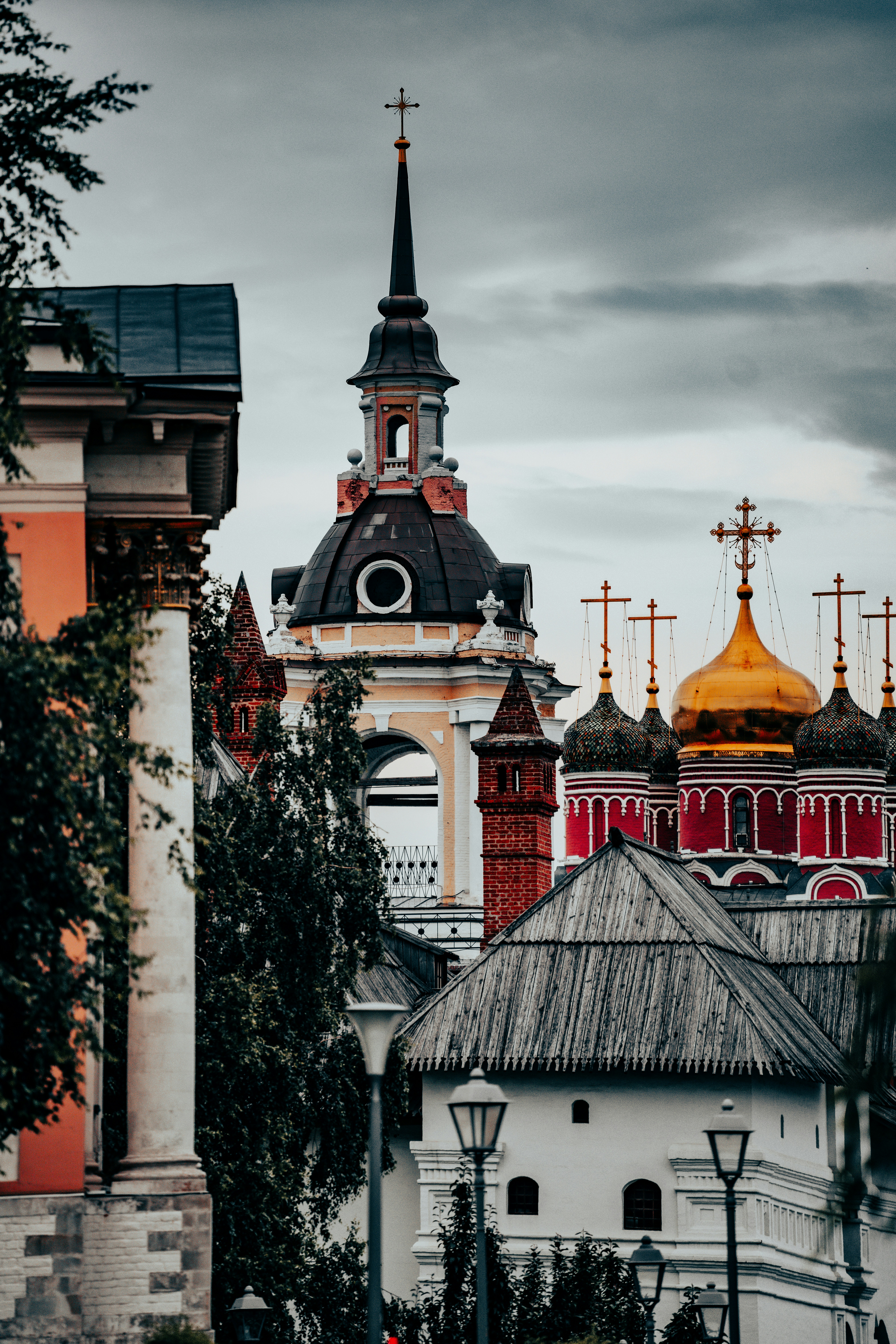 Spired Crown: A Cityscape of Onion Domes Under Steel Sky