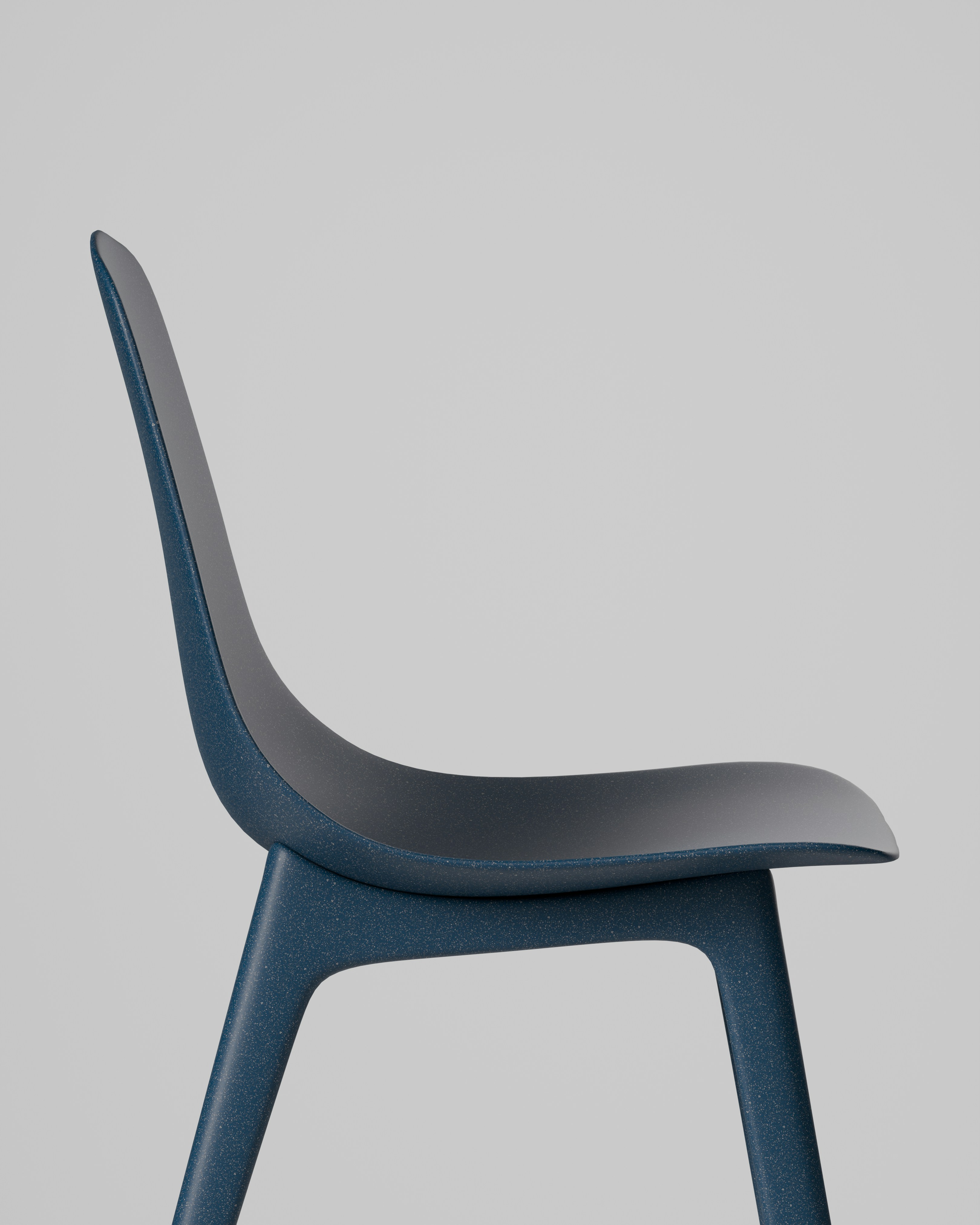 A modern blue chair is shown in profile. photo – Free Texture Image on ...