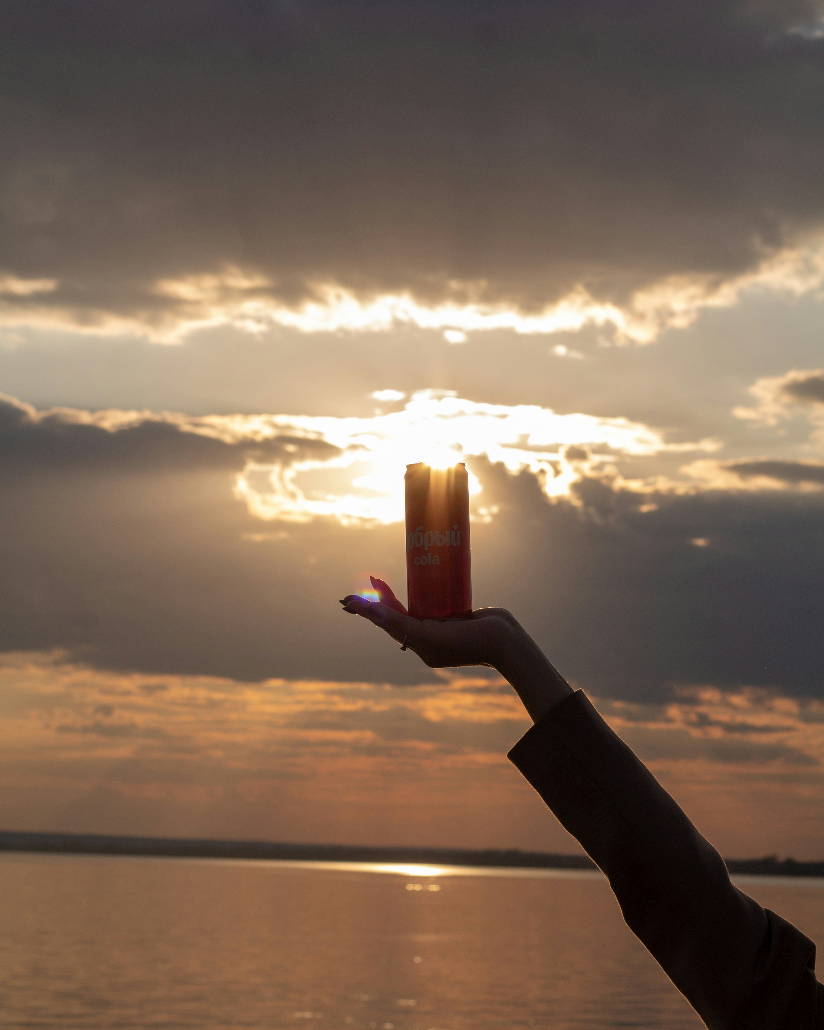 Embracing the Sunset with a Cup of Serenity
