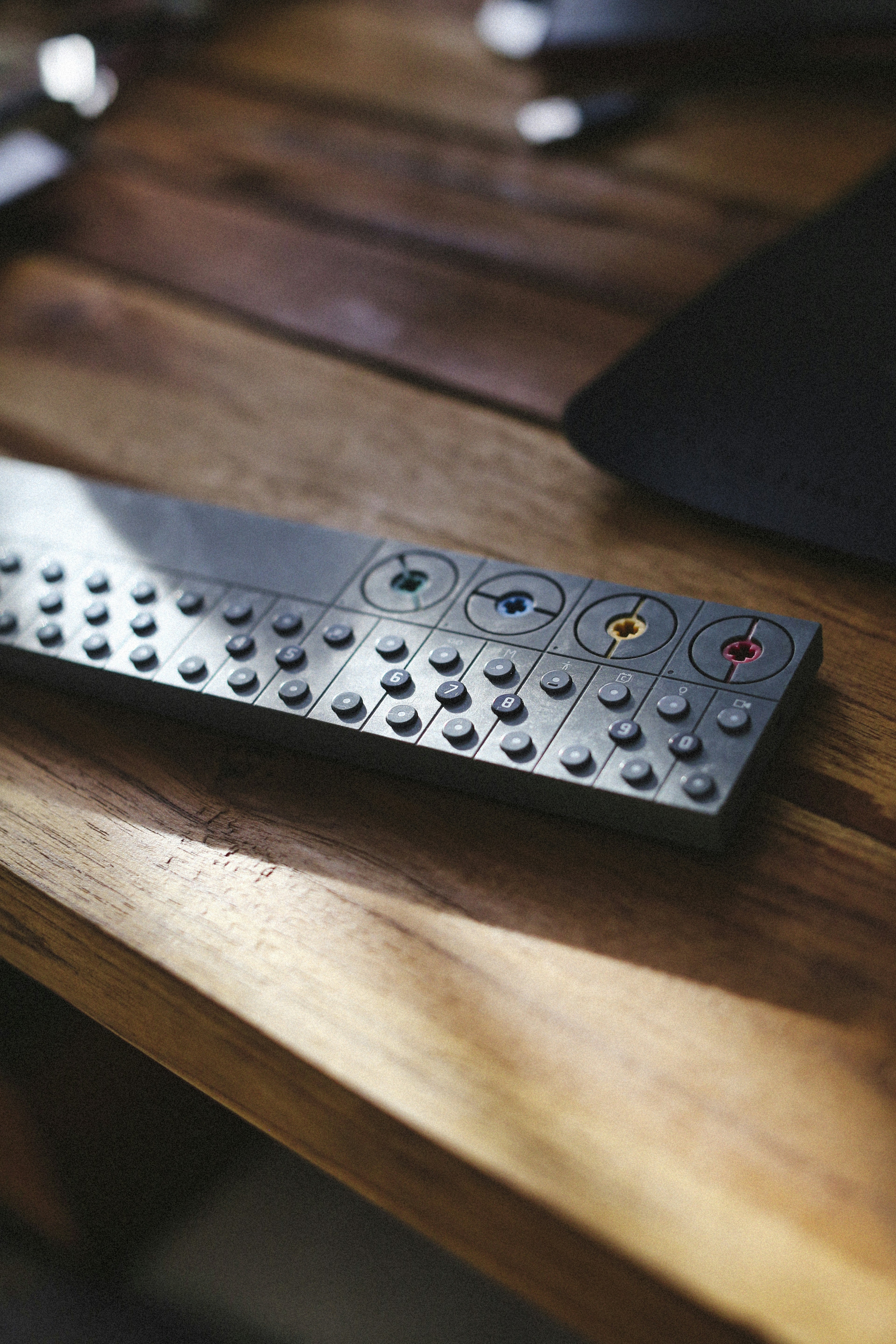 LEGO-style Cable-Top Controller on a Wooden Desk