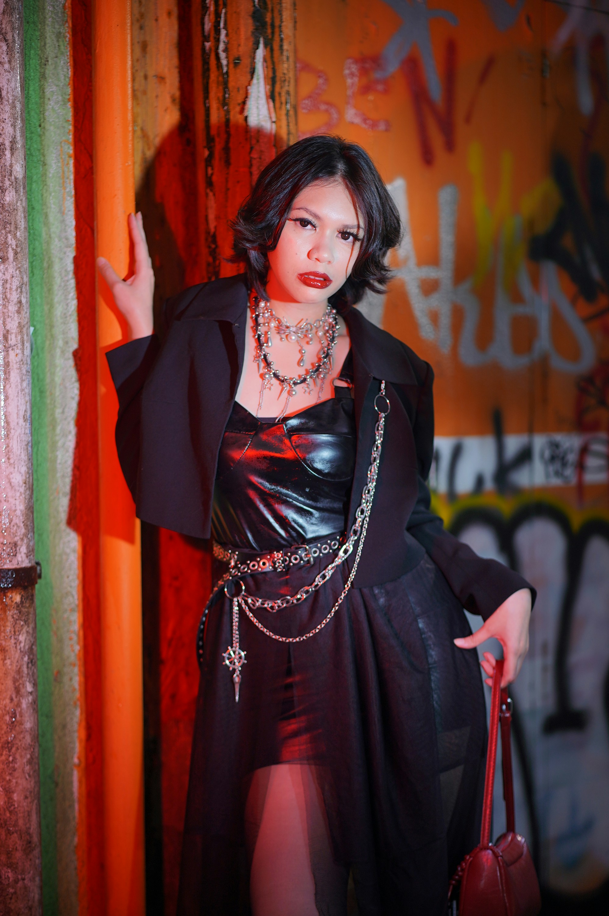Urban Elegance: A Modern Muse in Graffiti's Embrace
