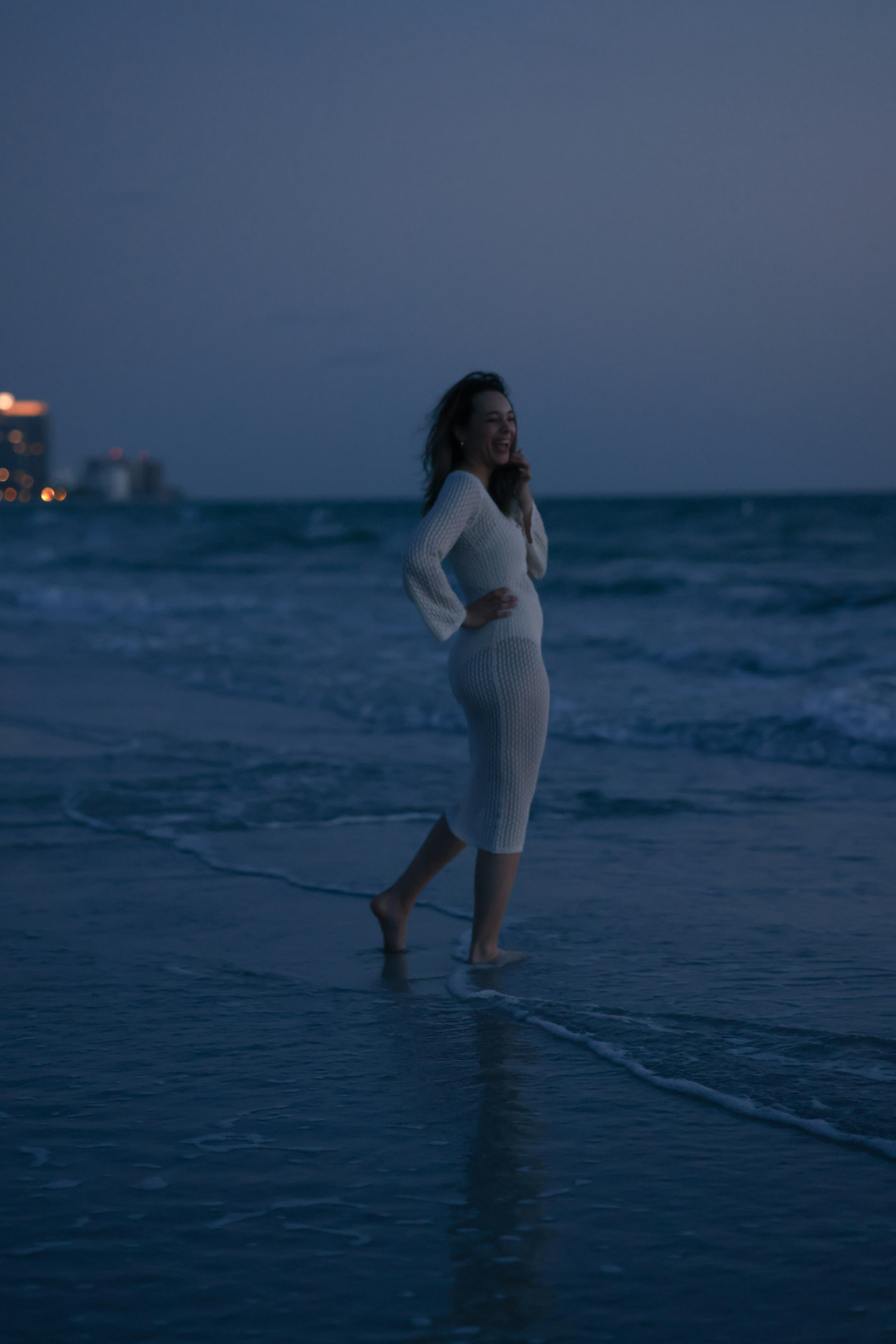 Moonlit Stride: A Seaside Evening Portrait