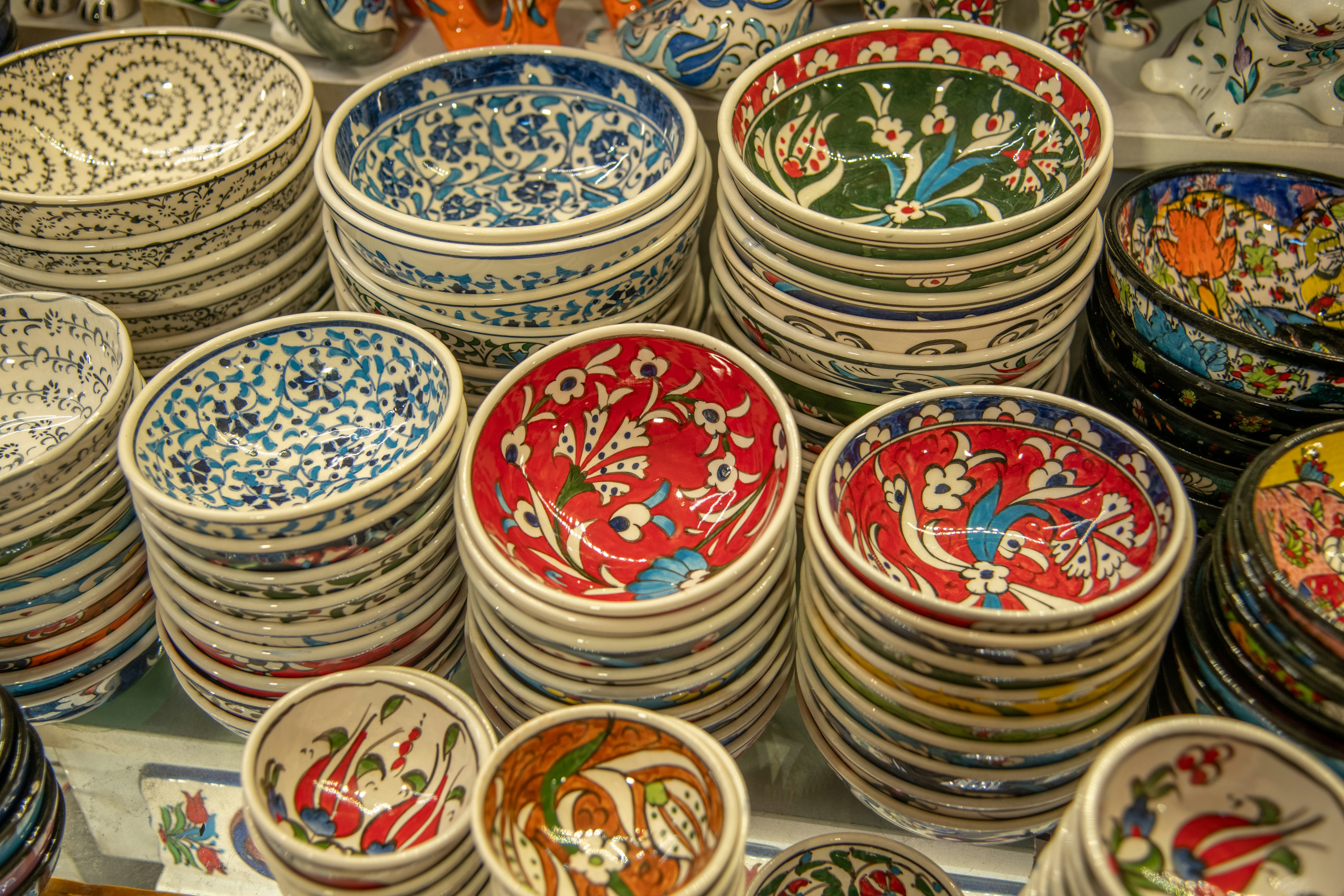 Stacks of colorful, patterned bowls are on display. photo – Free Art ...