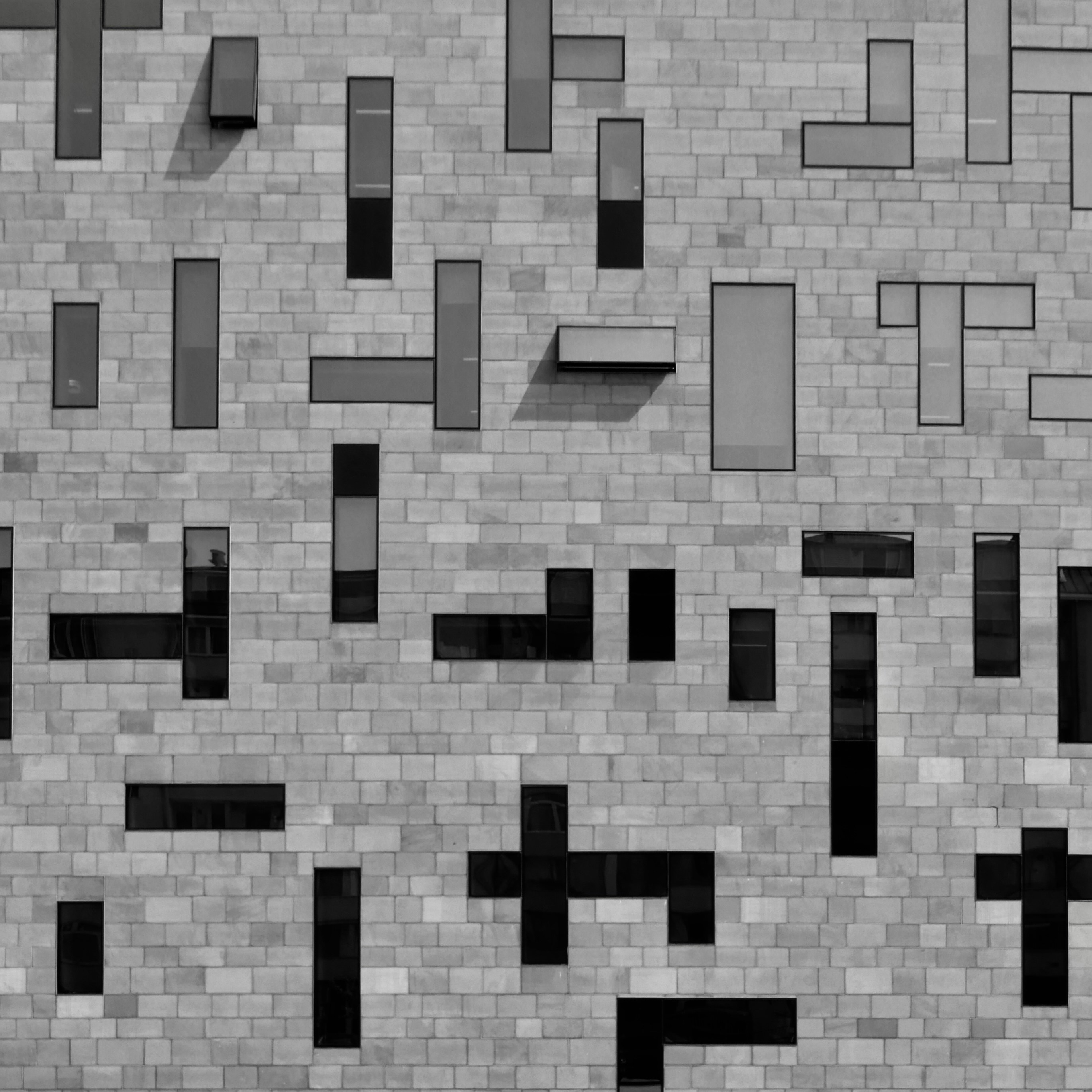 Geometric Facade: A Mosaic of Windows and Panels