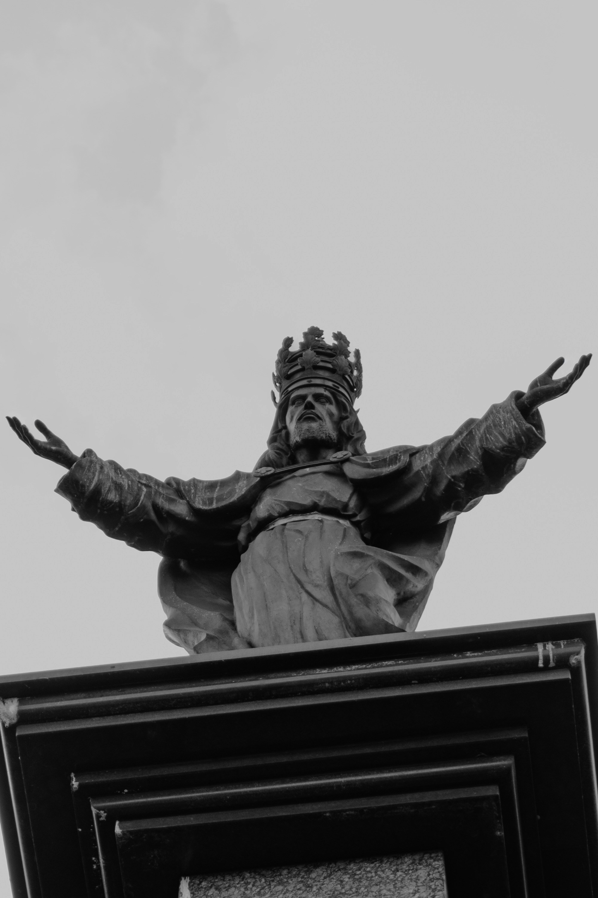 Jesus Christ. Monument in Wroclaw, Poland. | A statue of jesus christ with outstretched arms.