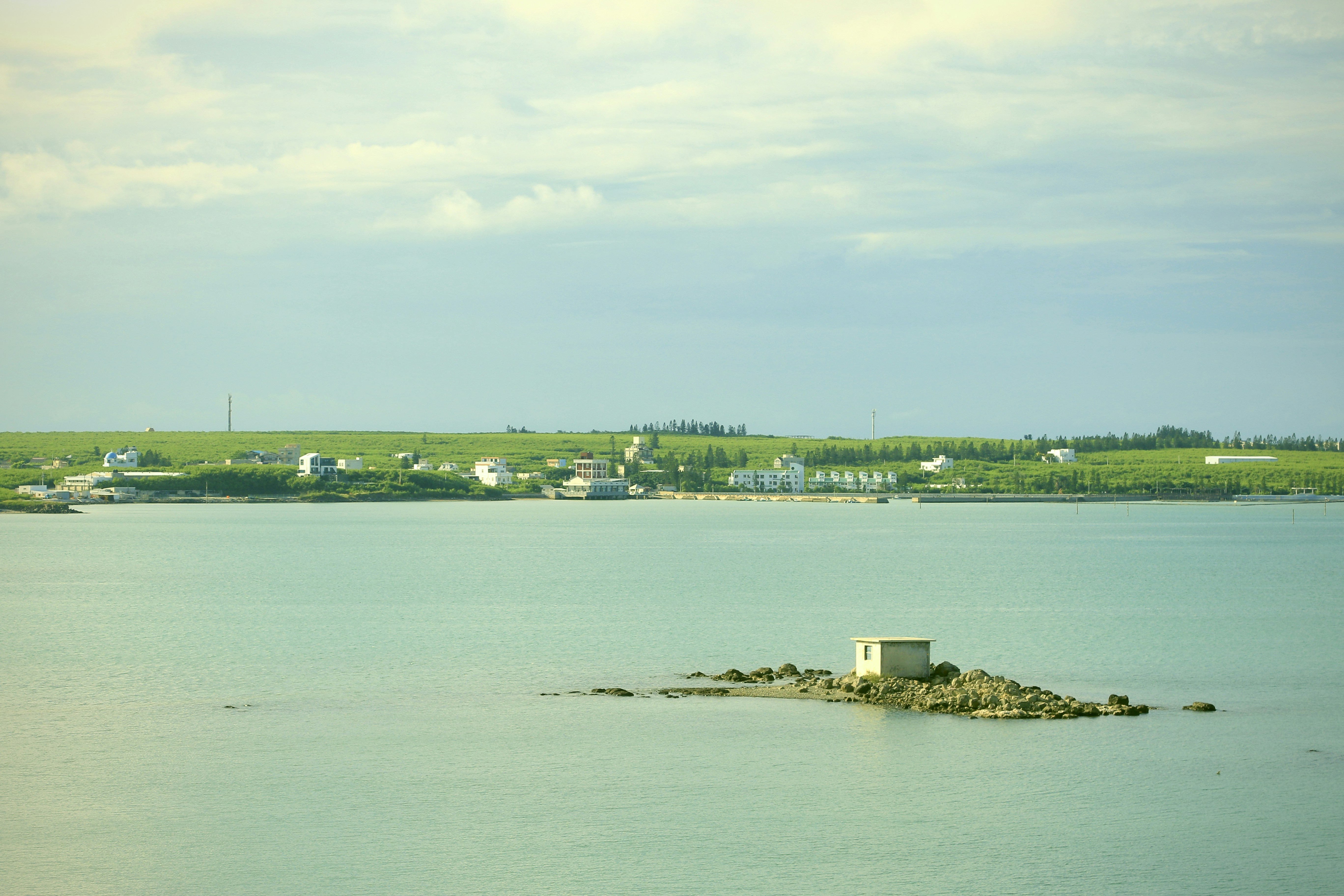 A small island with a structure is visible.