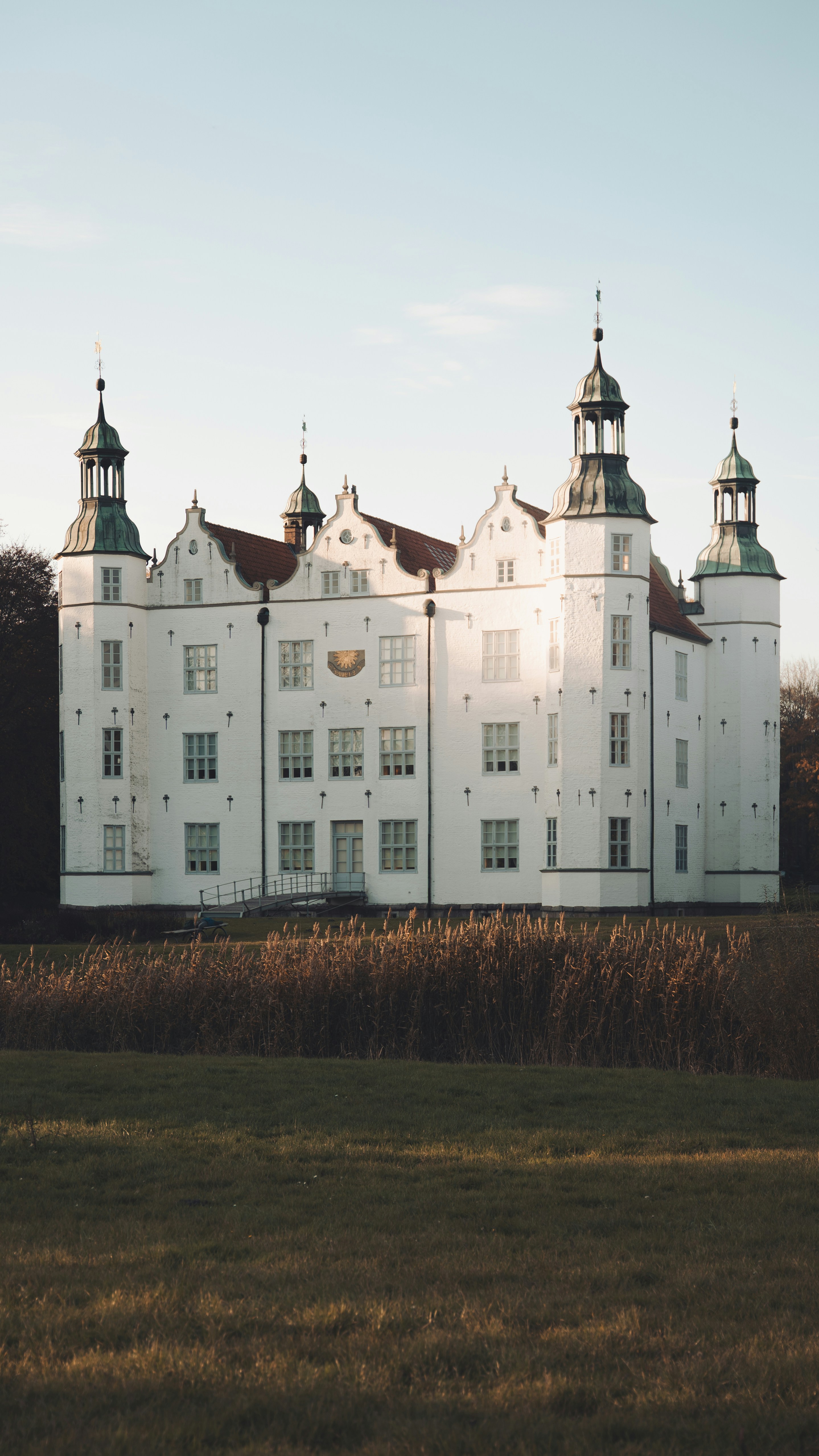 Ivory Fortress under a Pale Sky: Verdant-Topped Towers Rising from the Prairie