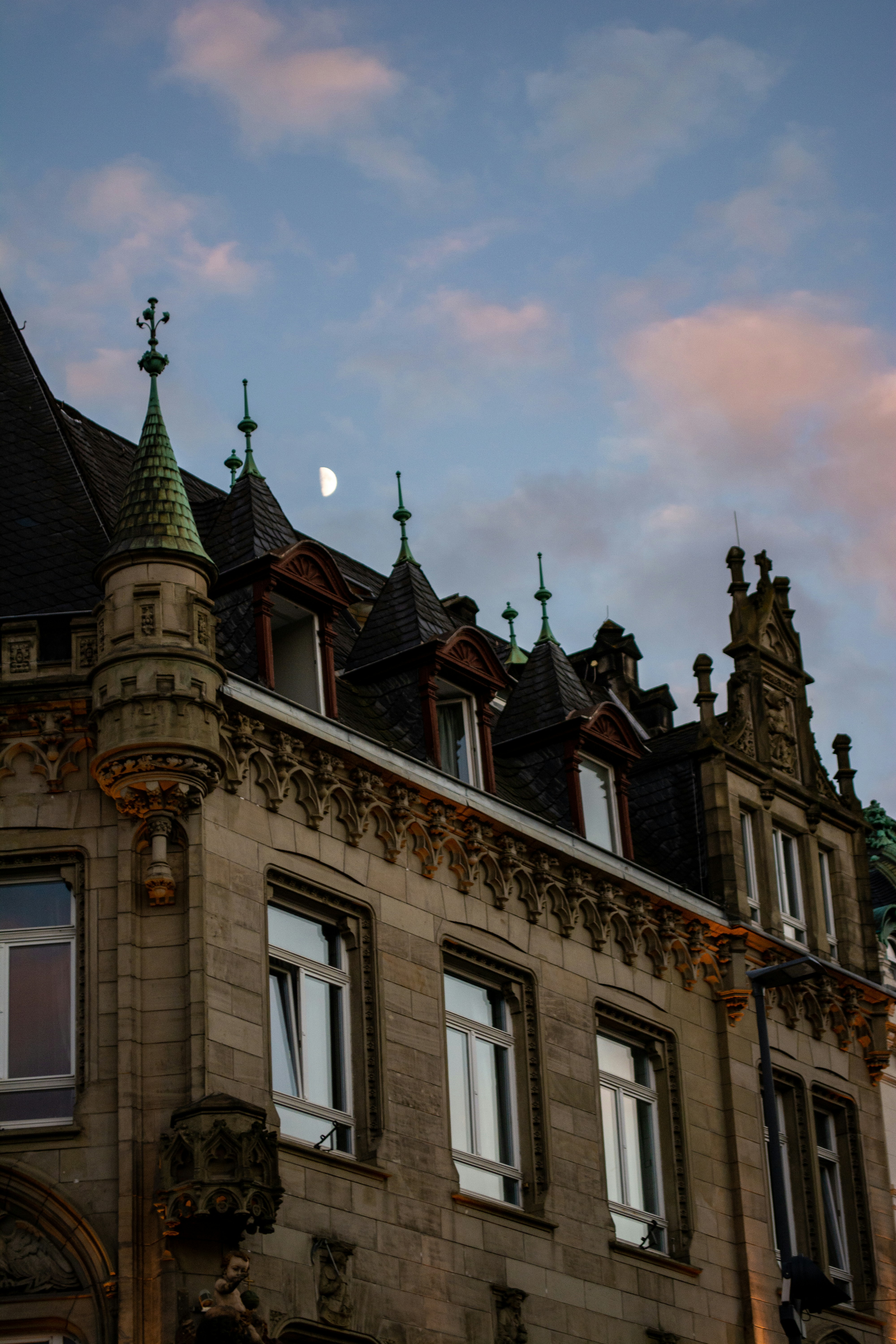 Moonlit Gables Over Ornate Stonework