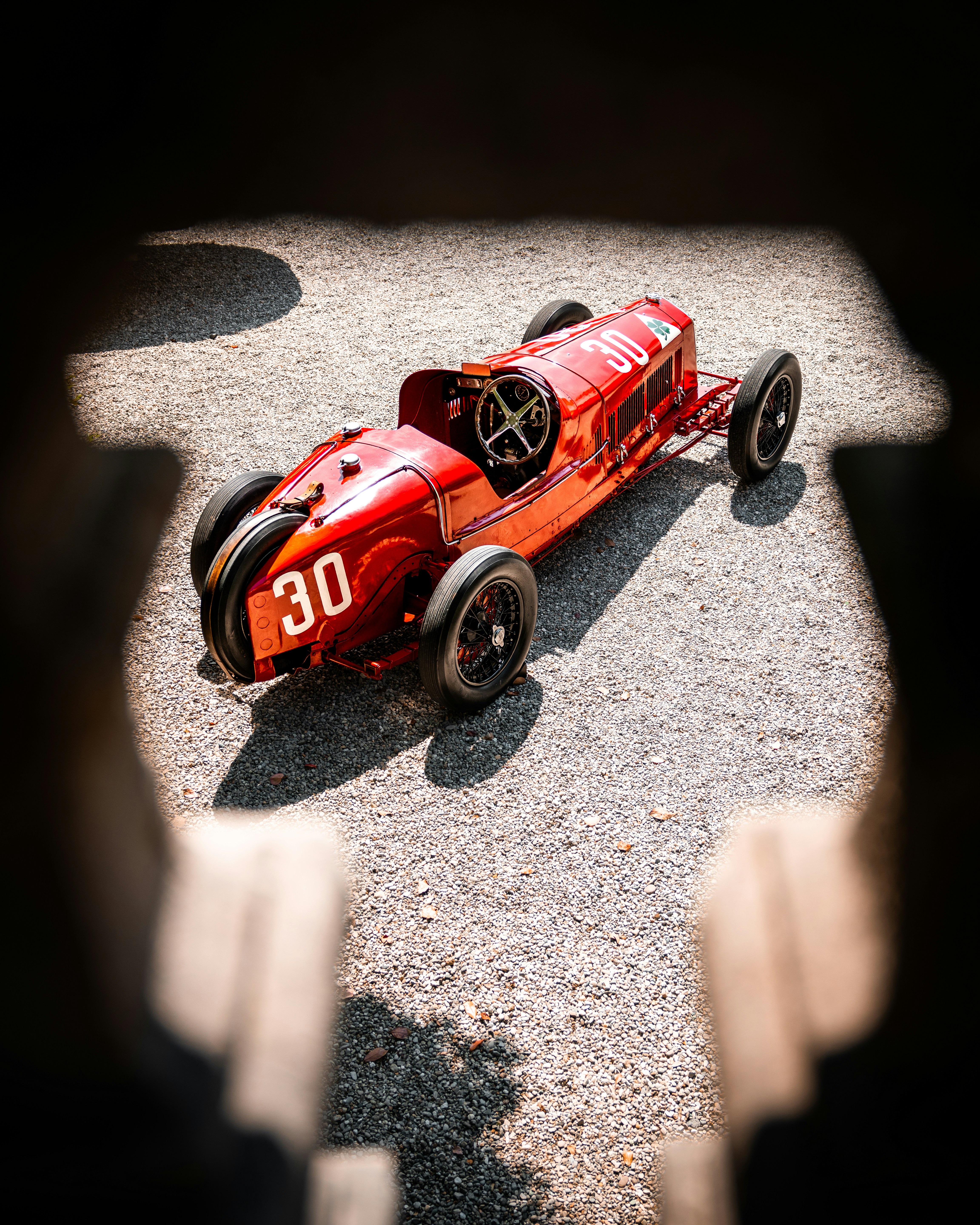 A vintage red race car number 30. photo – Free Car Image on Unsplash