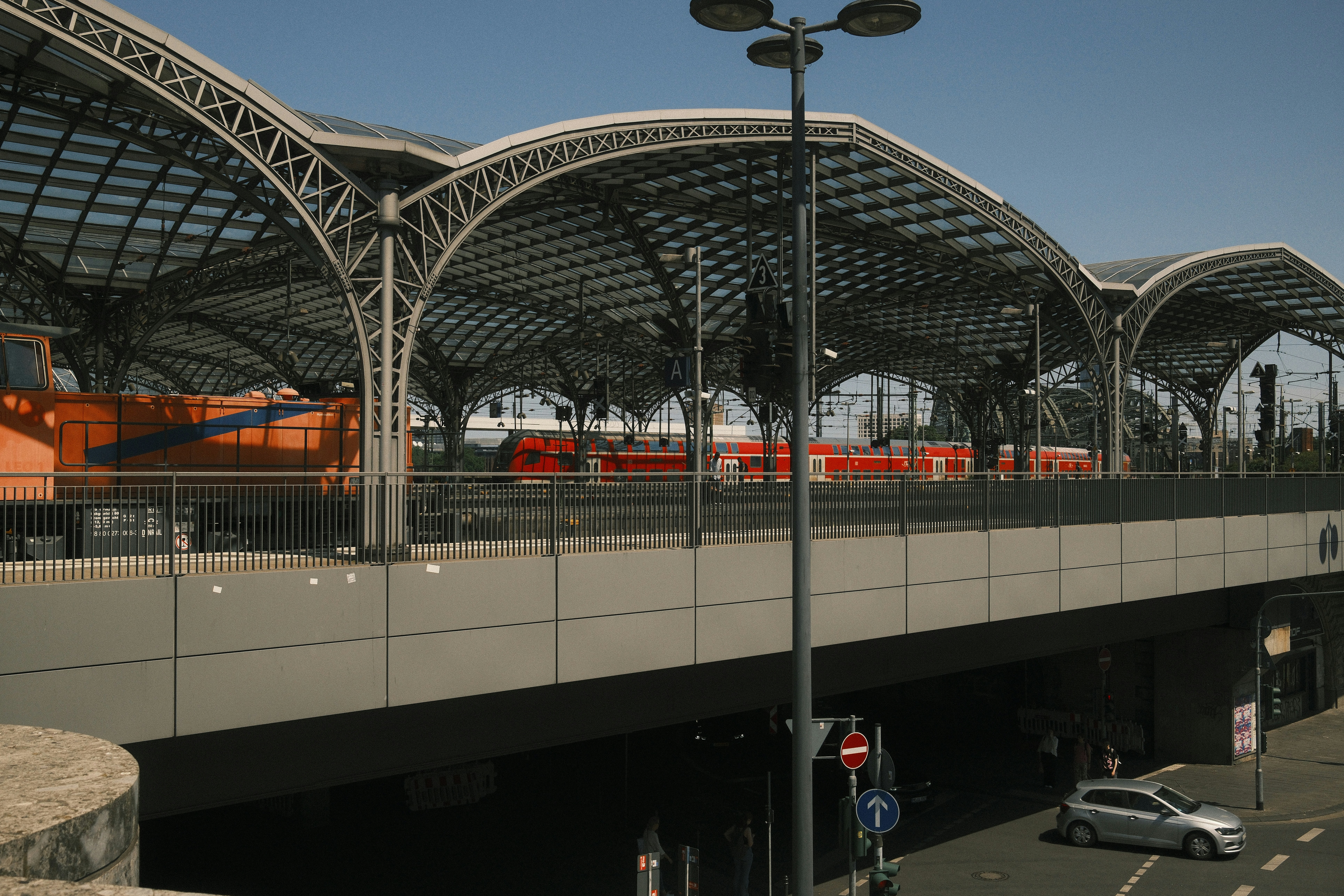 A train is passing through a modern train station. photo – Free City ...