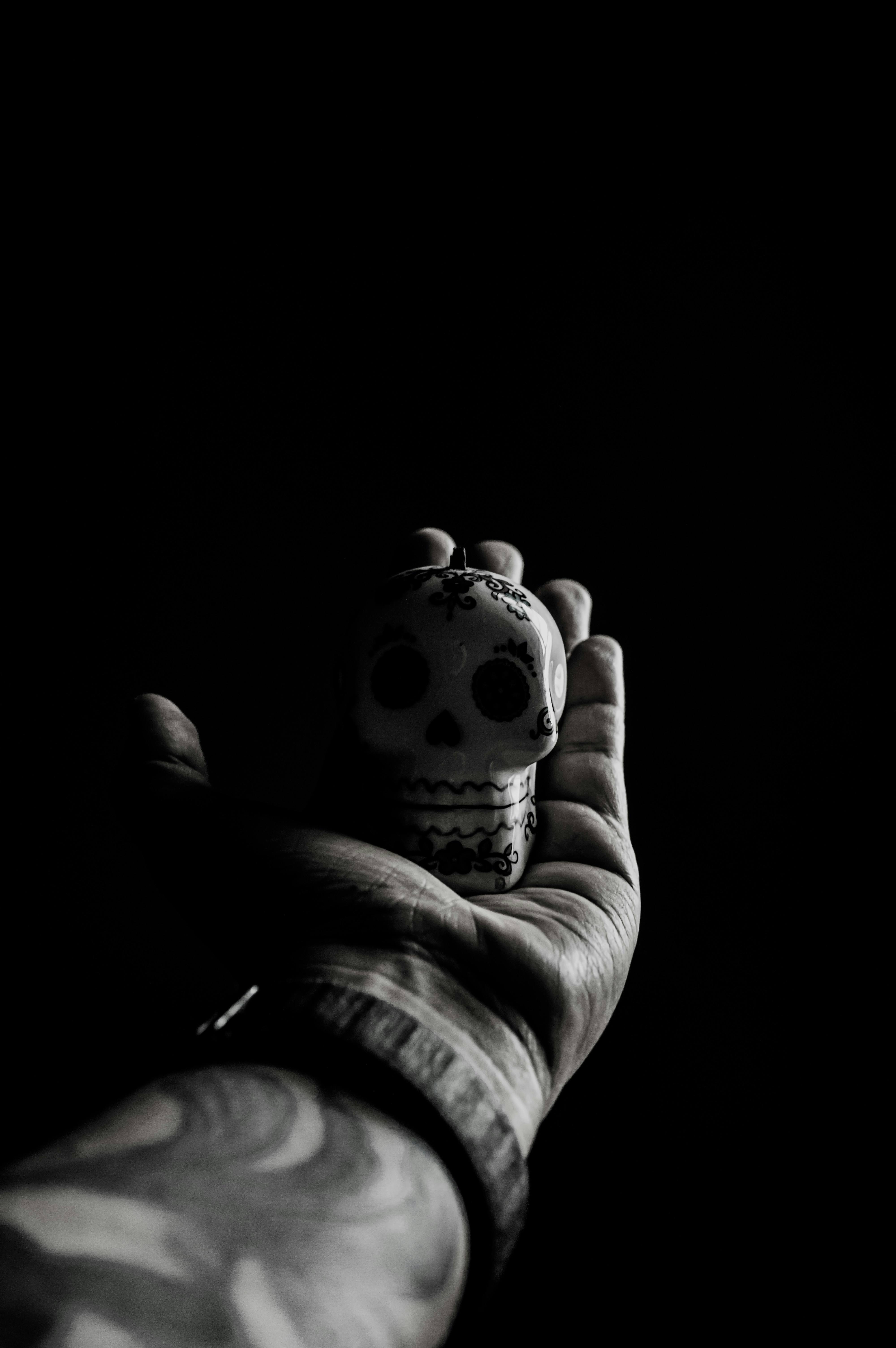 Whispers of Mortality: A Hand's Embrace