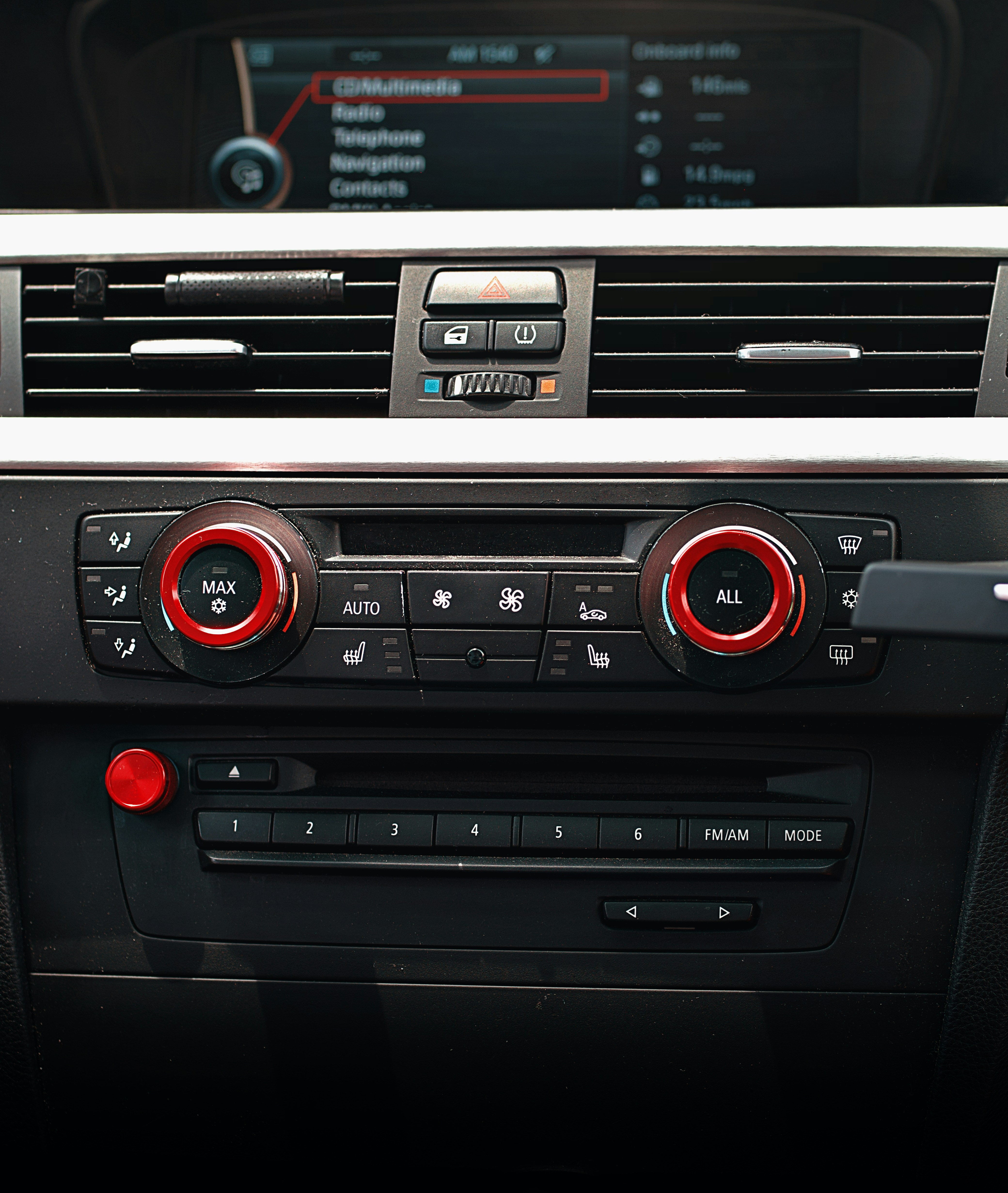 BMW E90 car photography taken in Huntersville, North Carolina nature preserve with vehicle owned by @bornmdriven. | Car's dashboard controls, radio, and air vents.