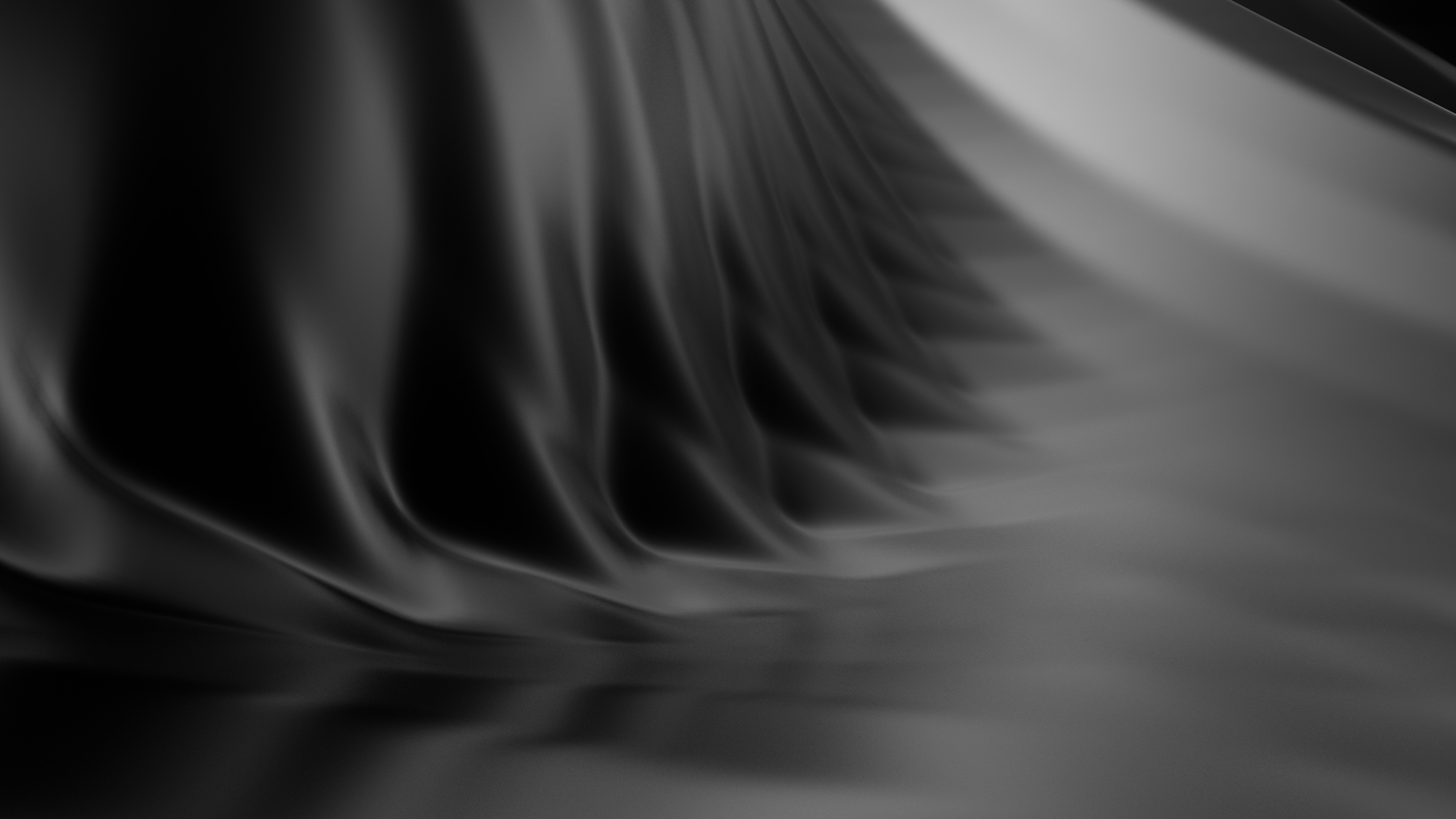 Flowing, silken fabric in grayscale creates an abstract pattern. photo ...
