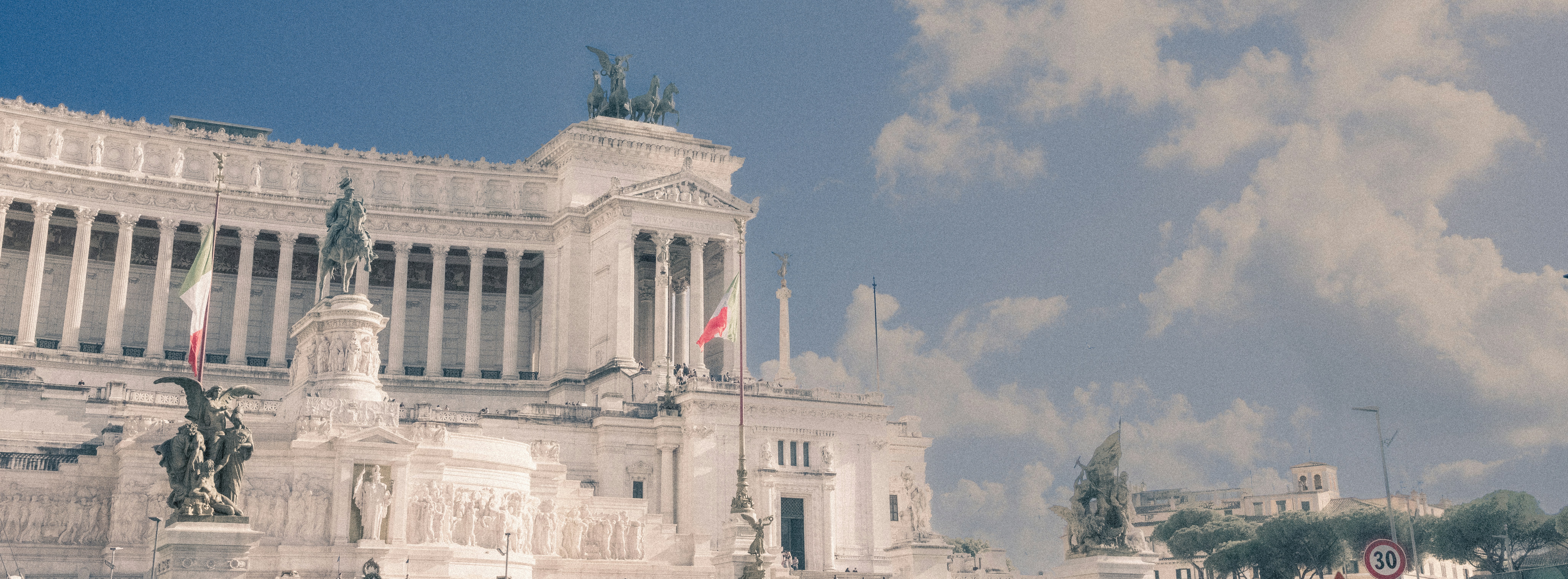 Step into the Grand Facade: Monumental Detail Under a Clear Sky