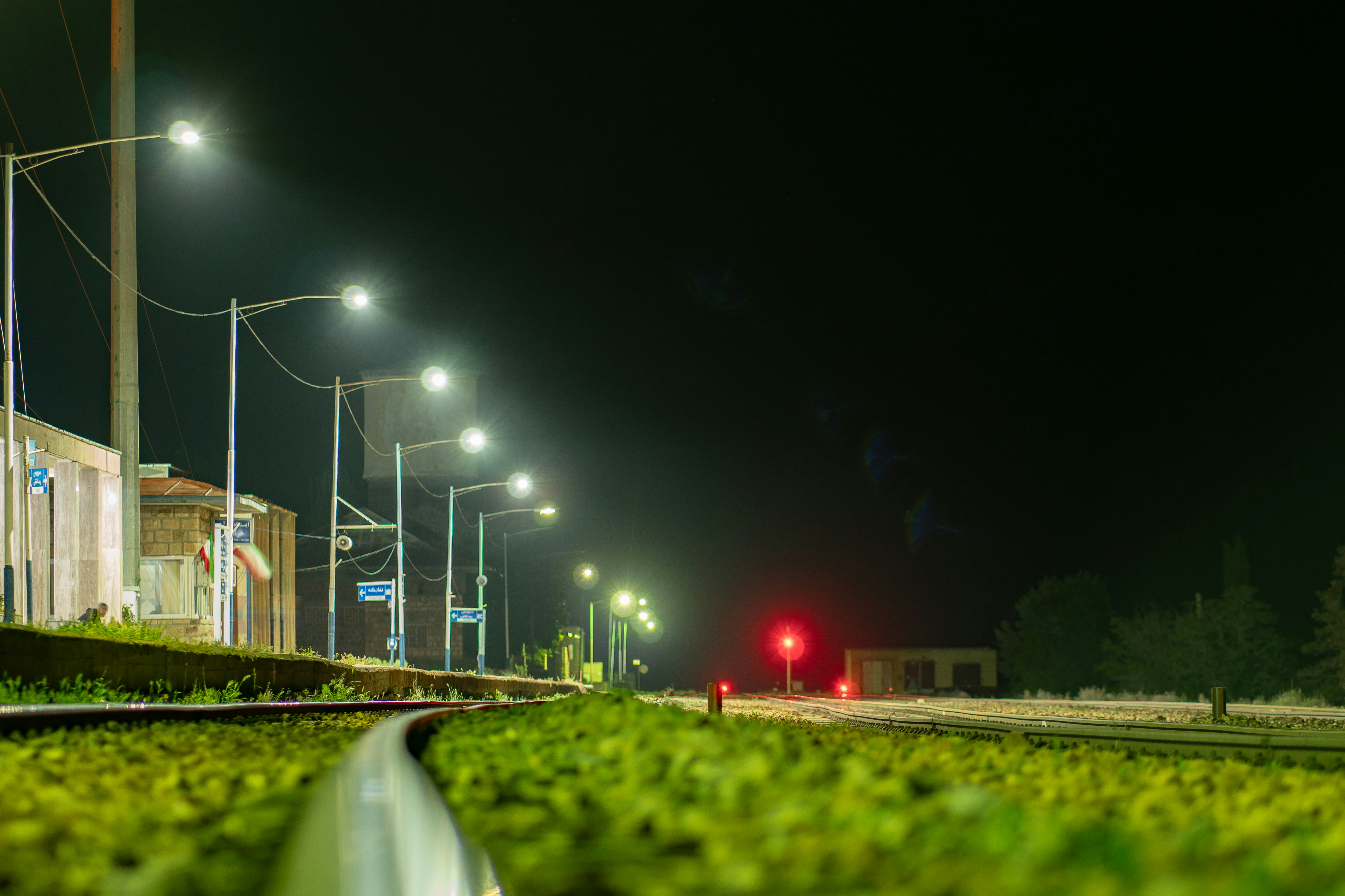 Whispers of the Night: A Train Station's Solitary Glow