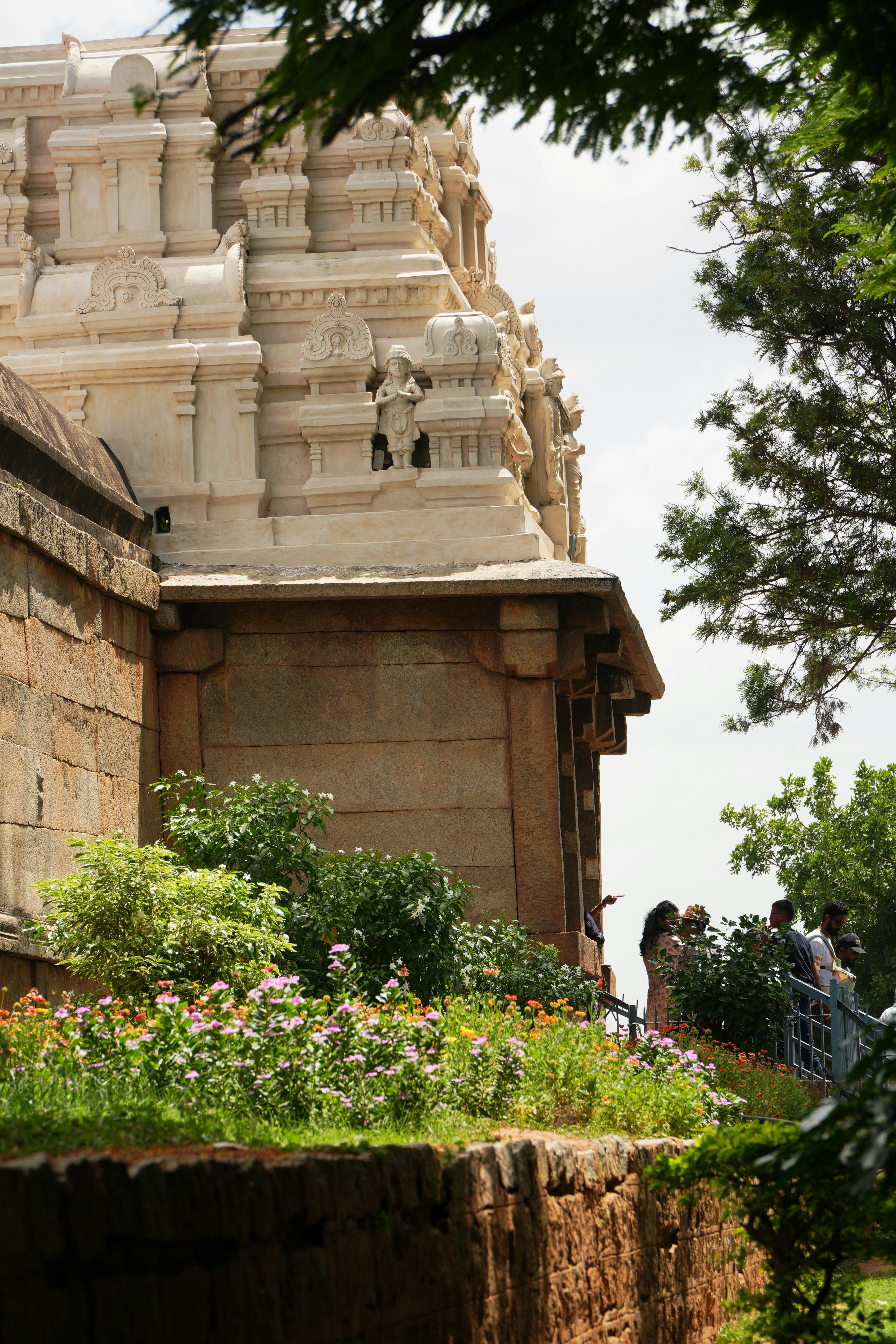 A beautiful ancient temple with people.