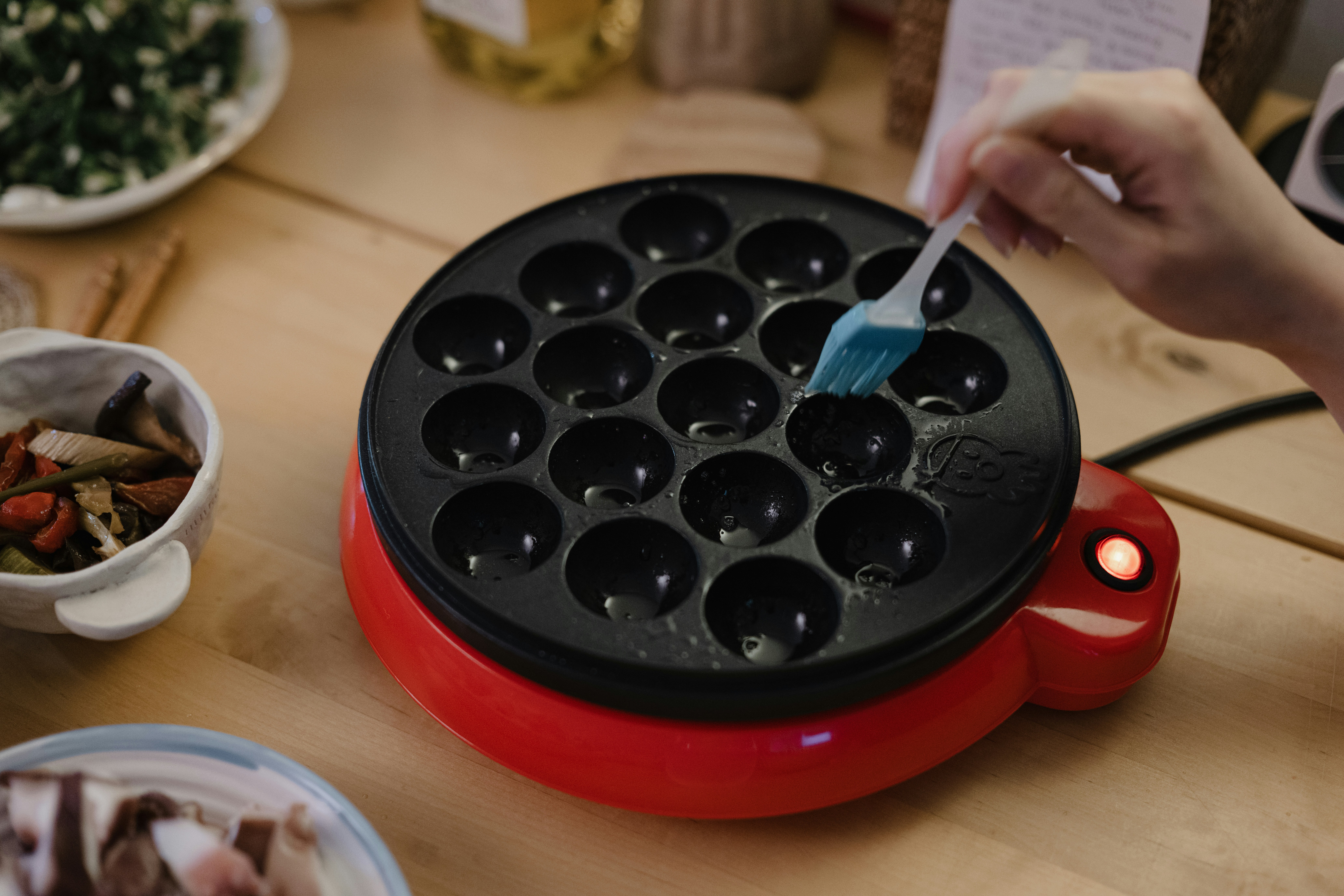 Culinary Craftsmanship: The Art of Takoyaki Preparation