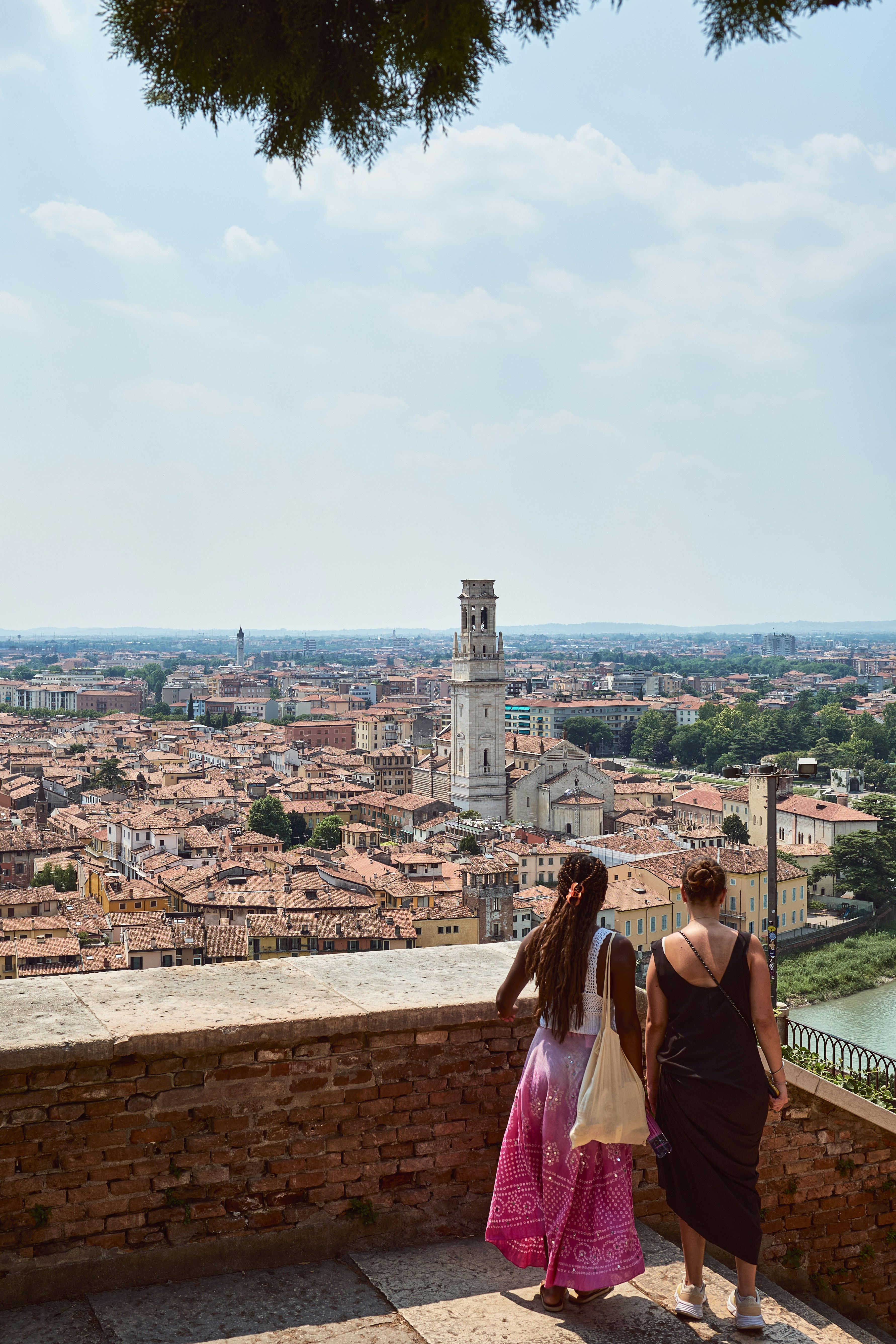 Over the Brick Balustrade: A Quiet Moment Above the Bell Tower
