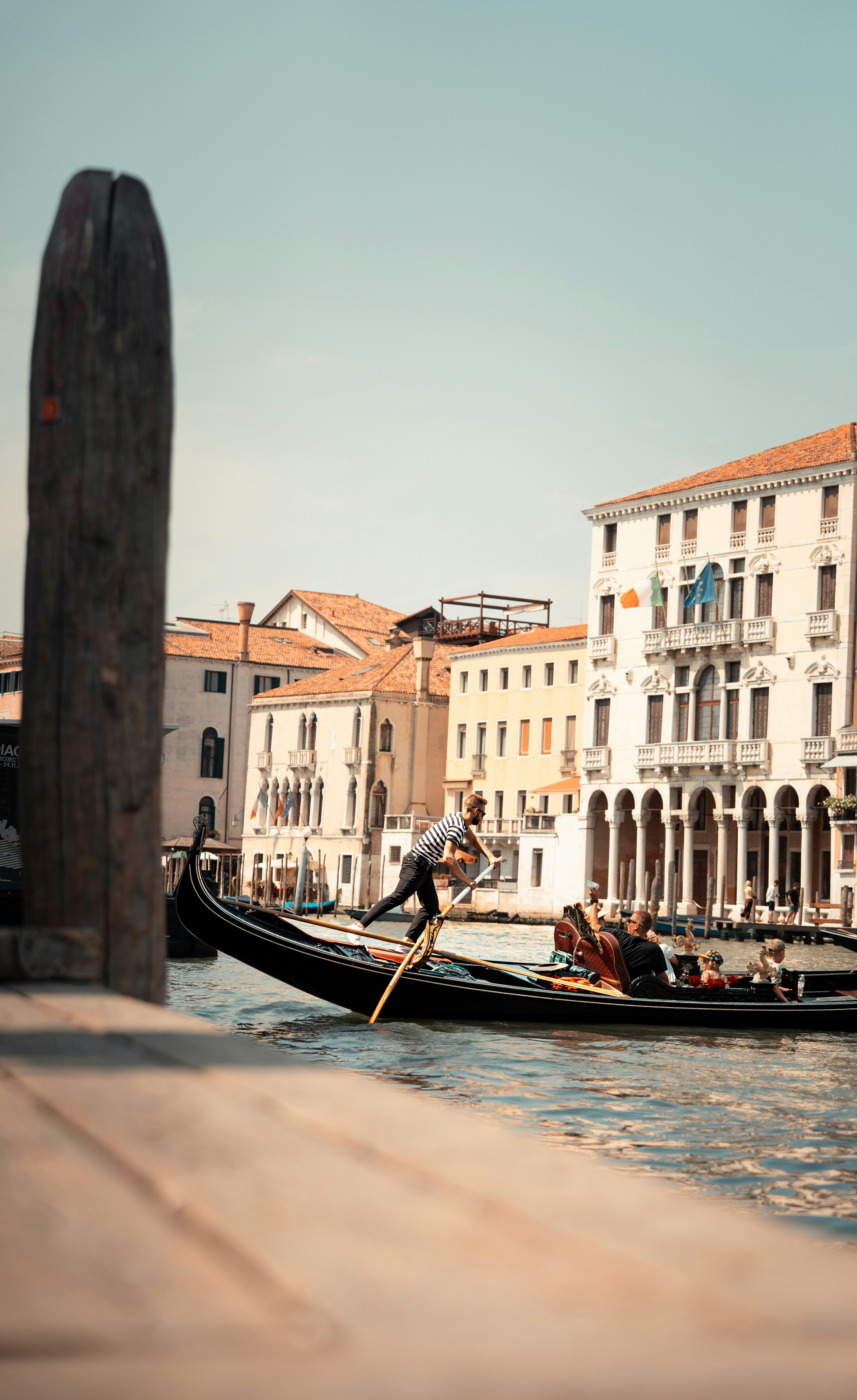 Gondola Glide Past Venetian Facades at Golden Hour