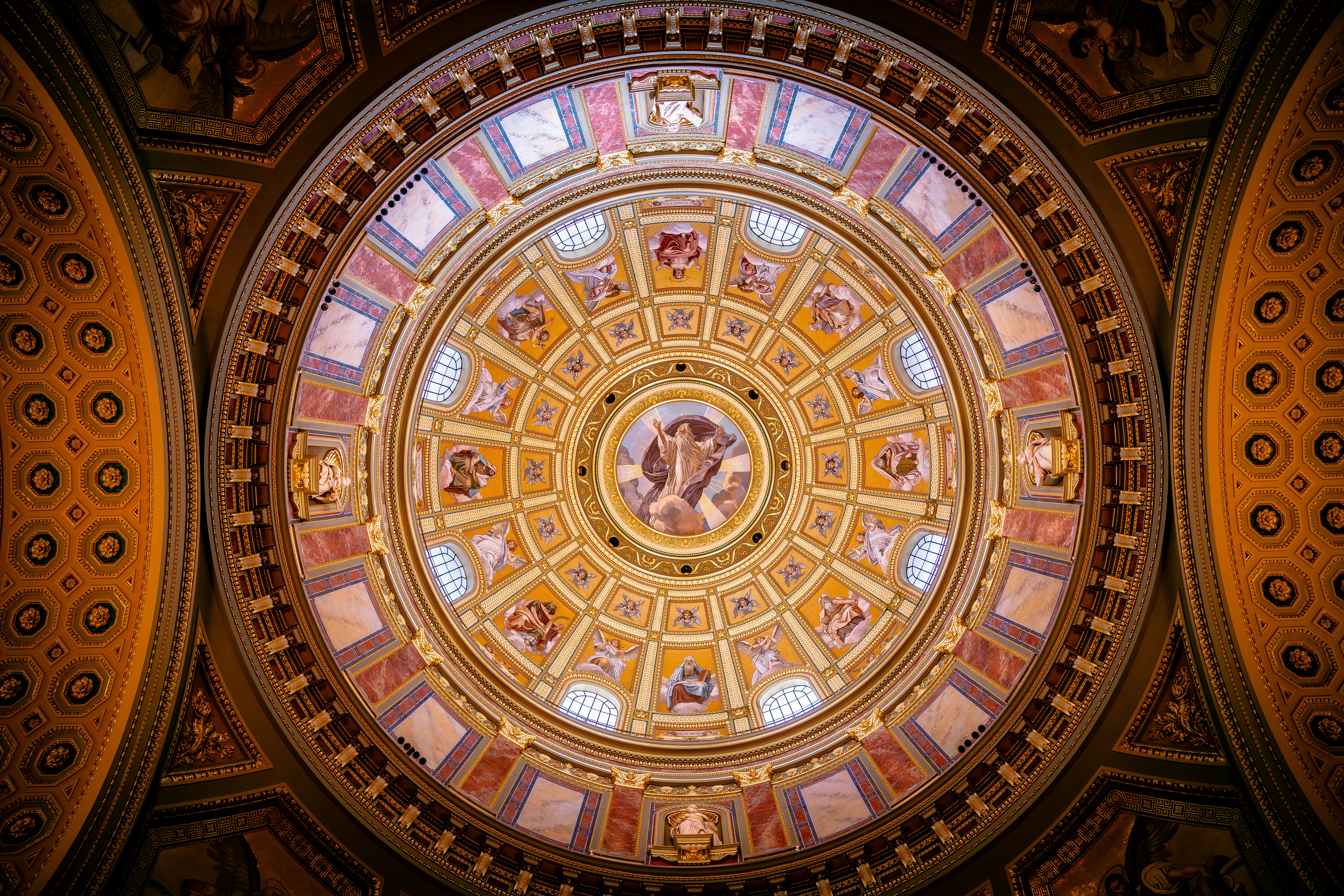 A decorative ceiling dome with intricate details.
