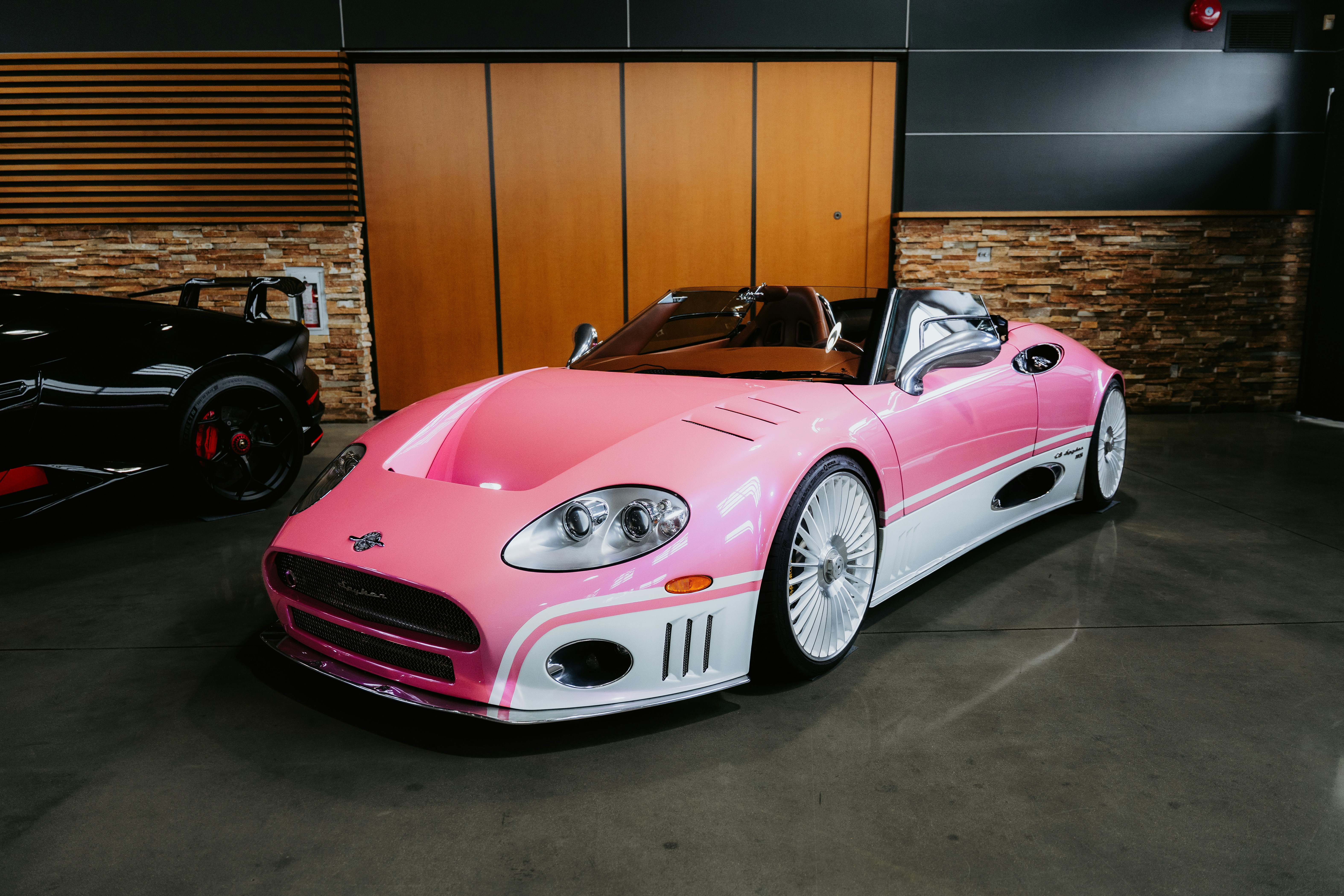 Candy-Pink Convertible in a Luxe Studio: Precision, Curves, and Showroom Glow