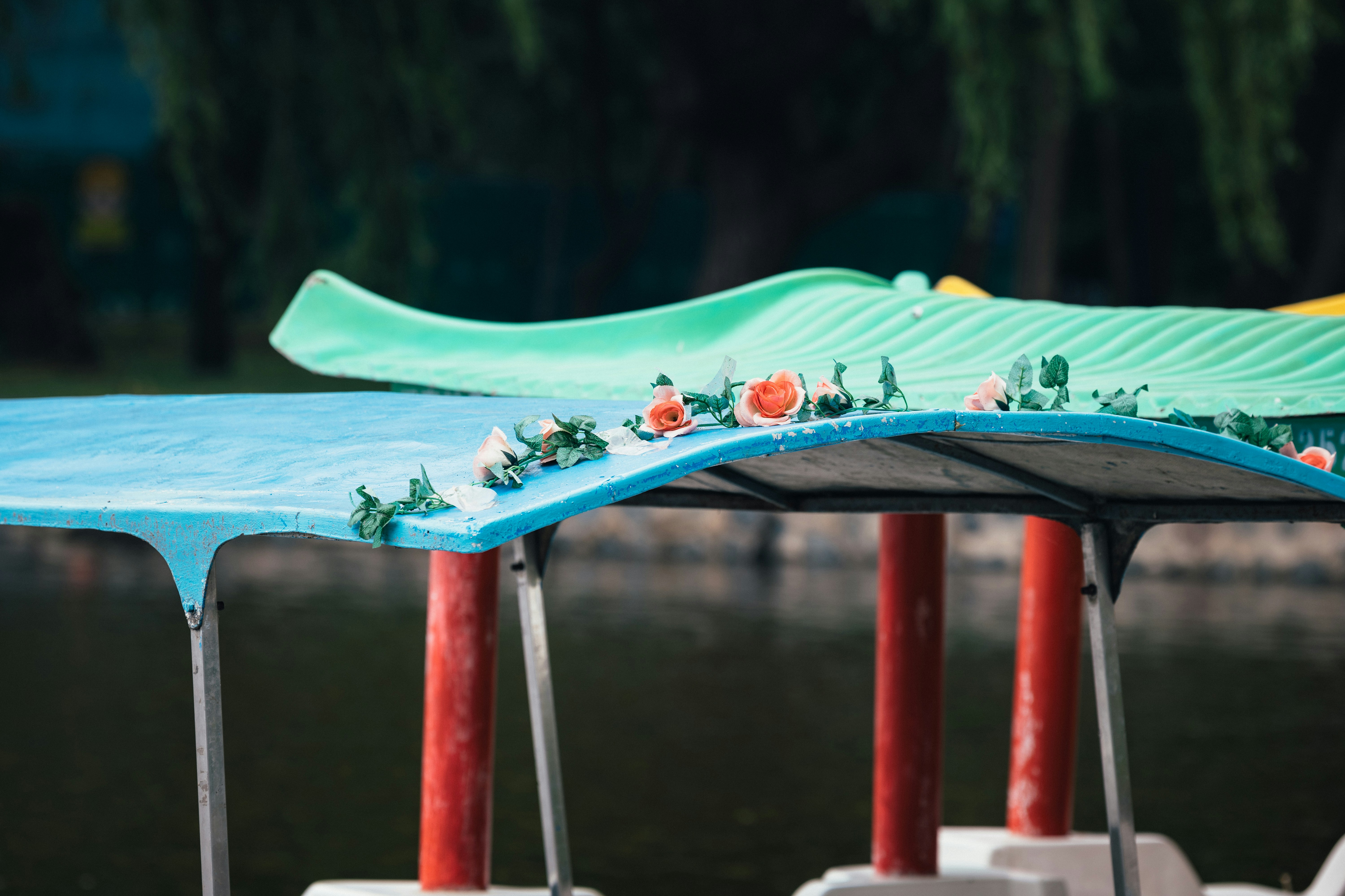 Serene Reflections on a Colorful Canoe