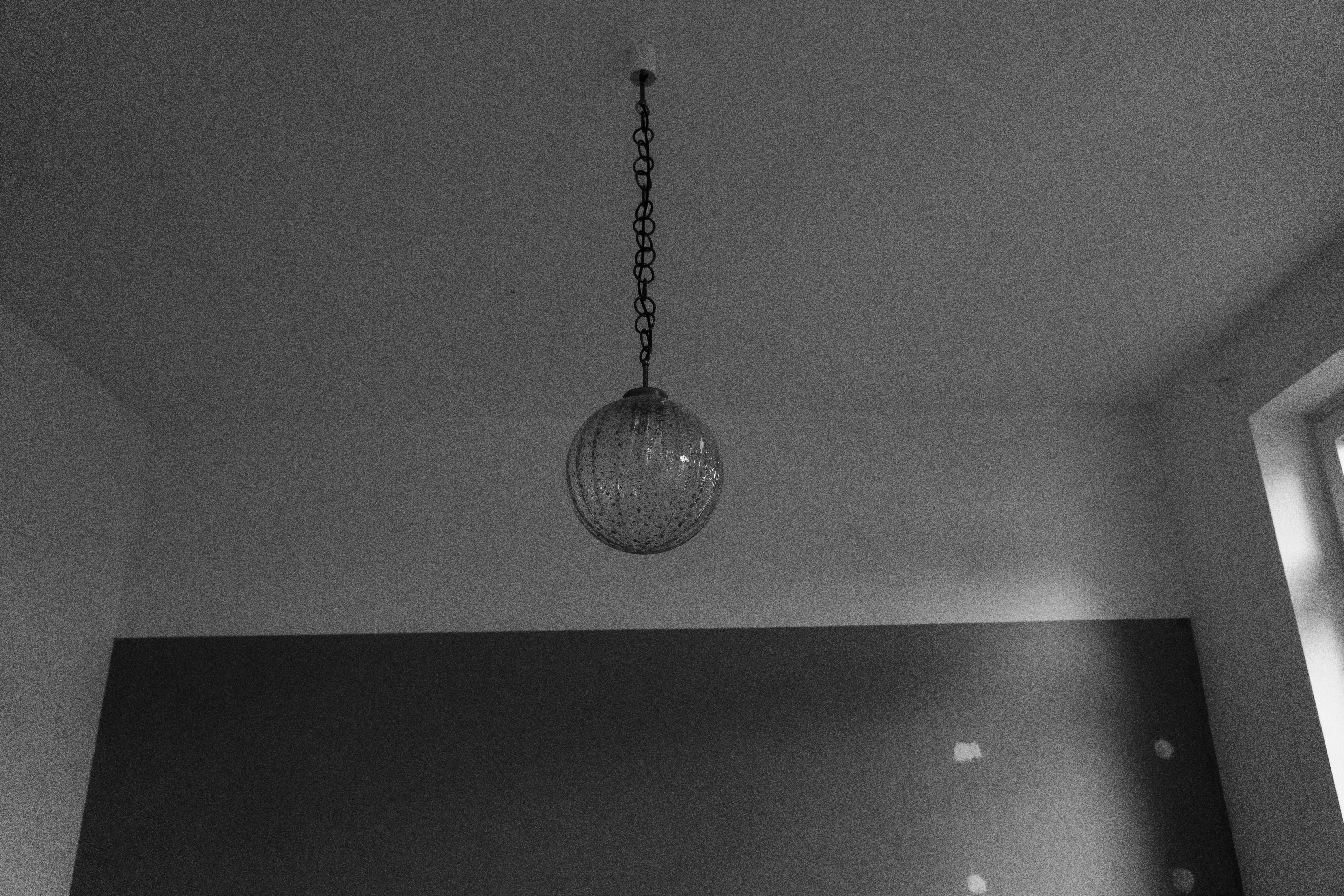 A hanging lamp hangs from the ceiling.