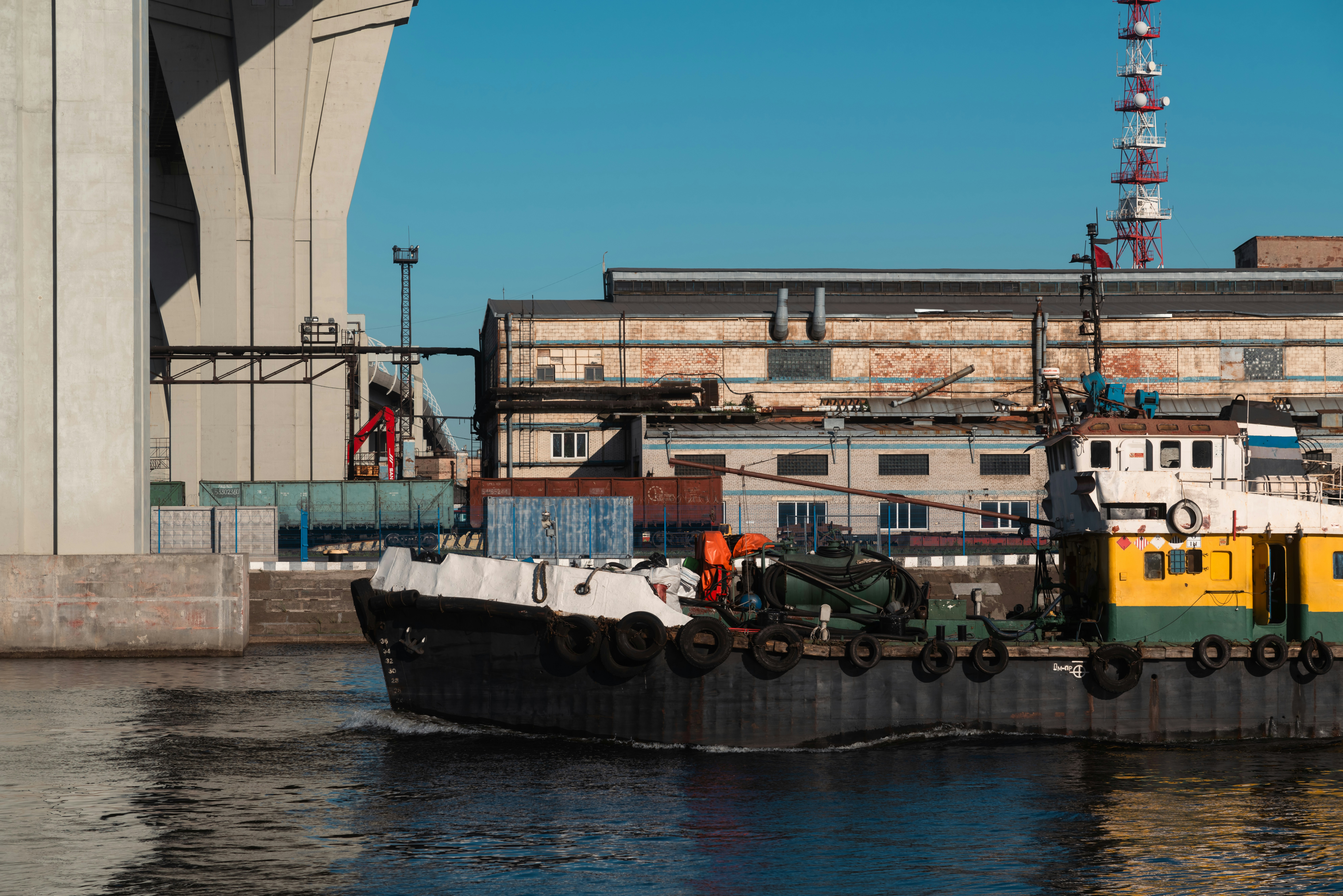 Industrial Harmony: The Dance of Vessel and Structure