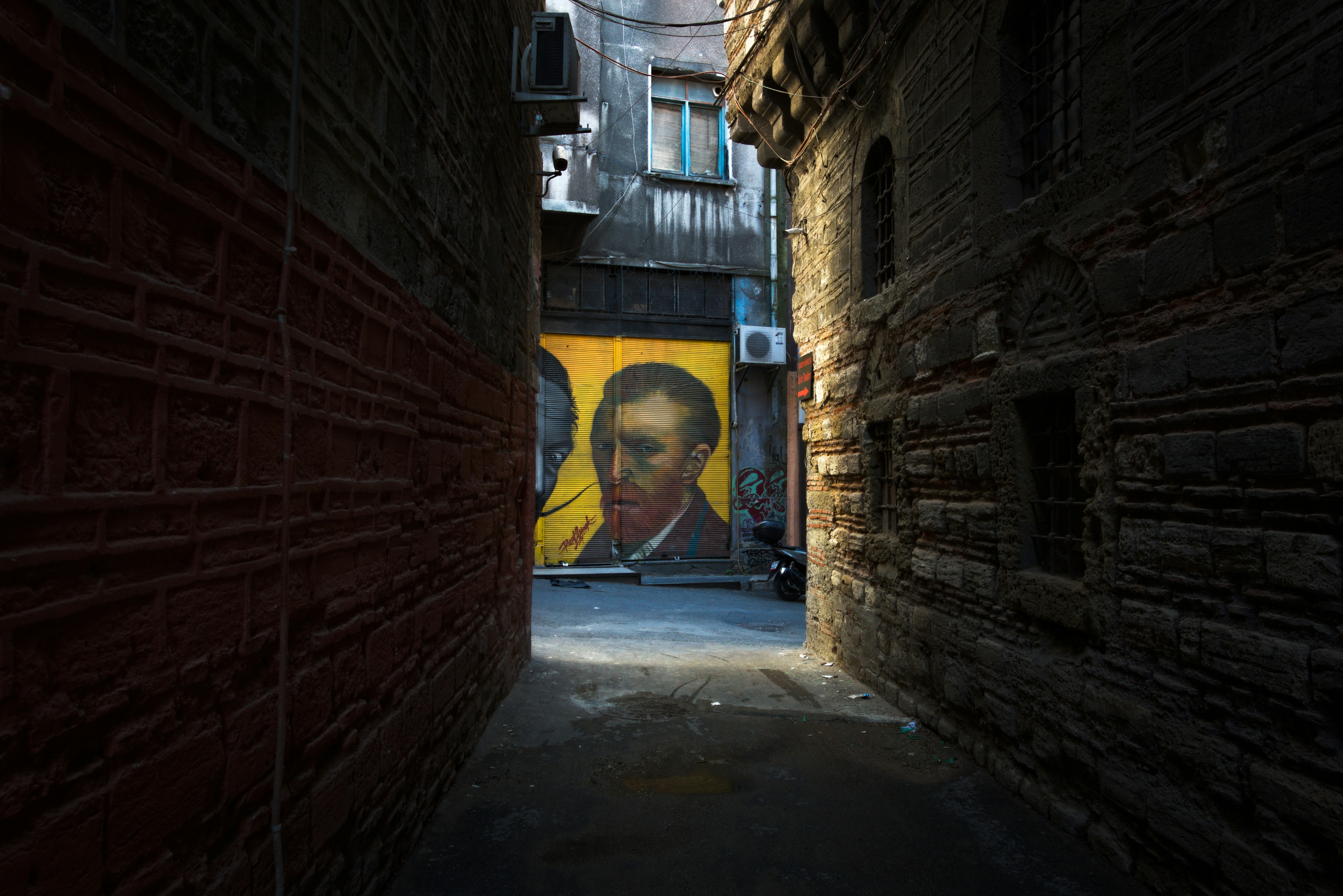 Yellow Gaze at the Alley’s End