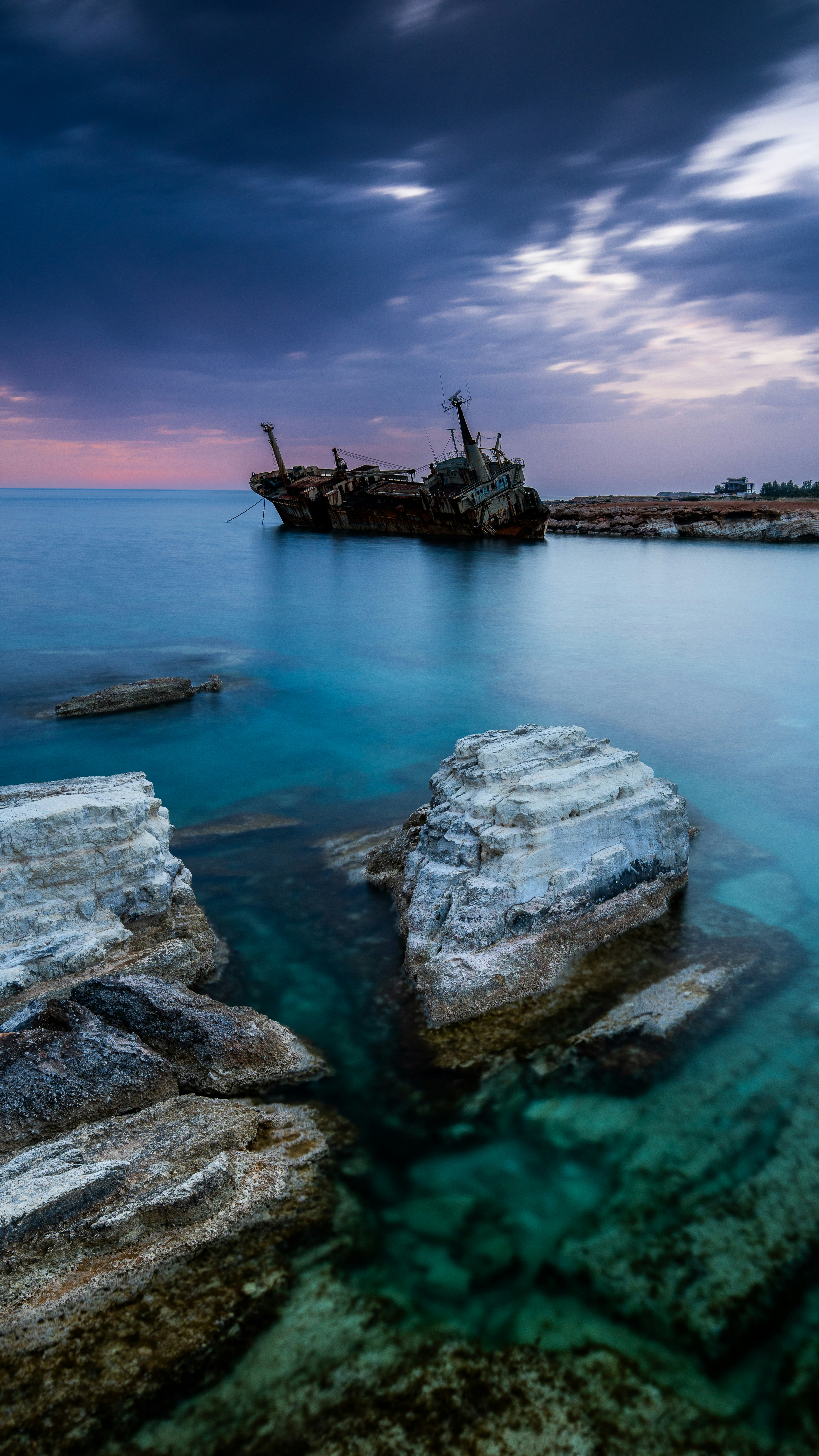 Sunken Vessel at the Edge of a Turquoise Abyss