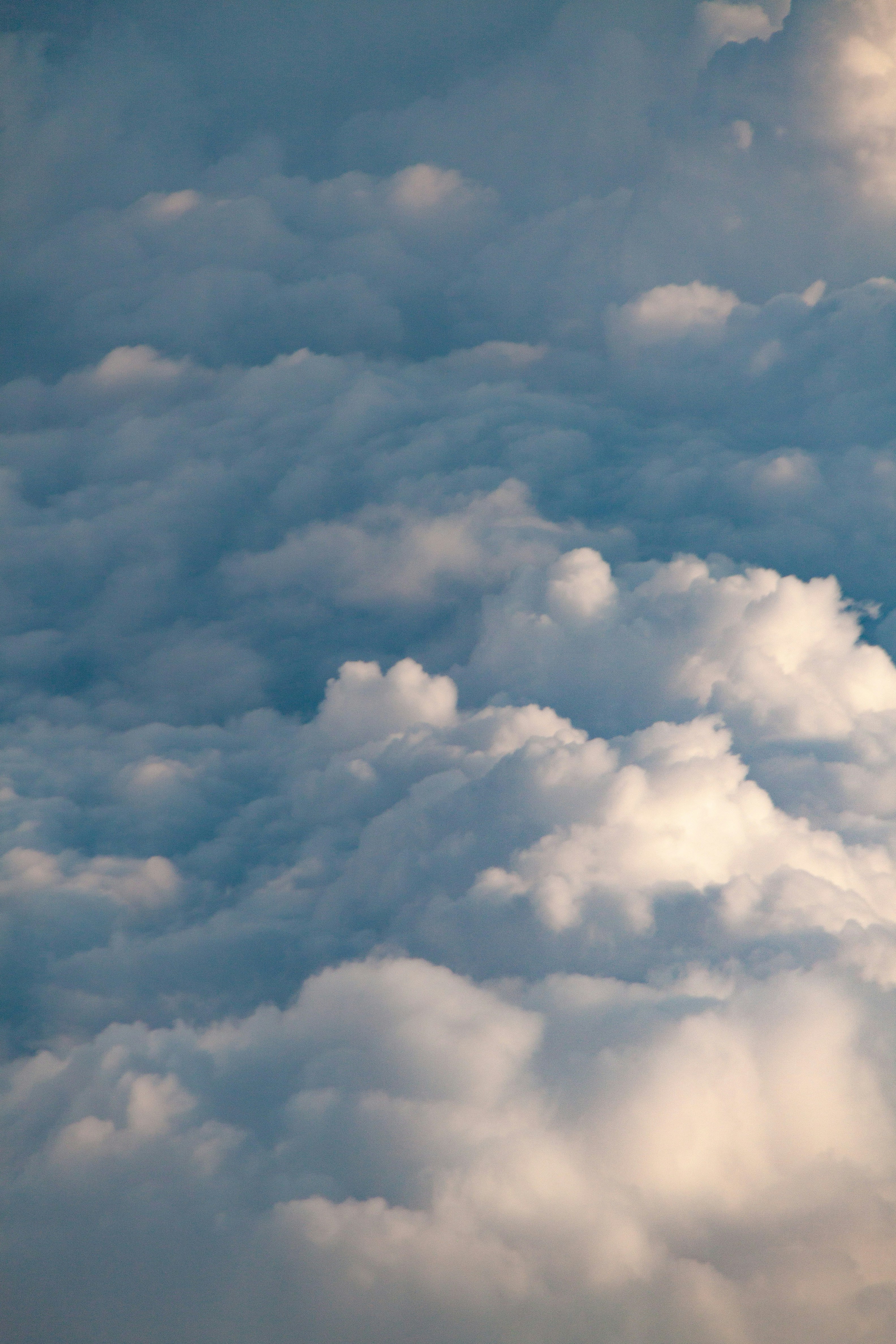 Clouds fill the blue sky on a sunny day. photo – Free Clouds Image on ...