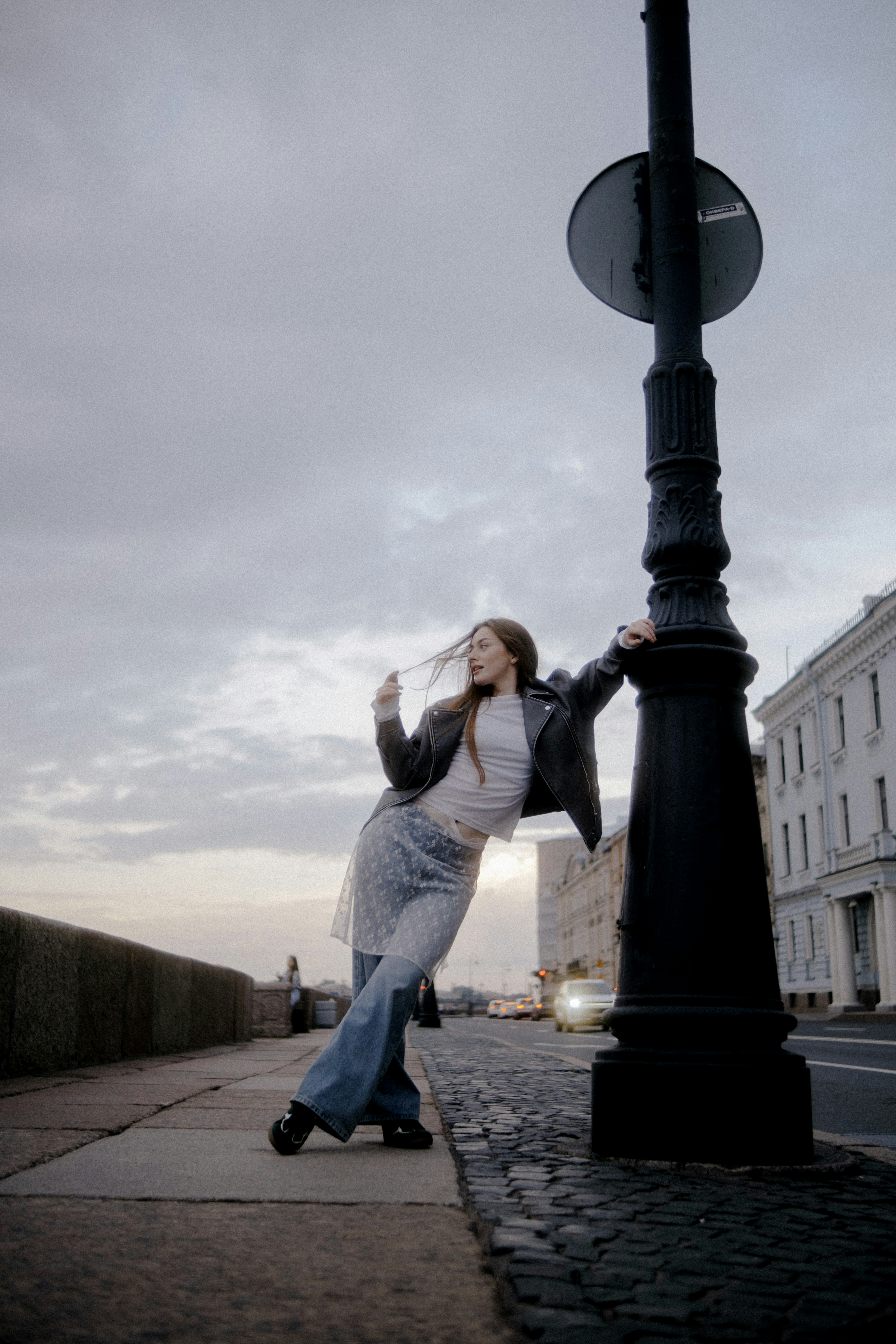 Effortless Balance: A Street Pose by the Lantern
