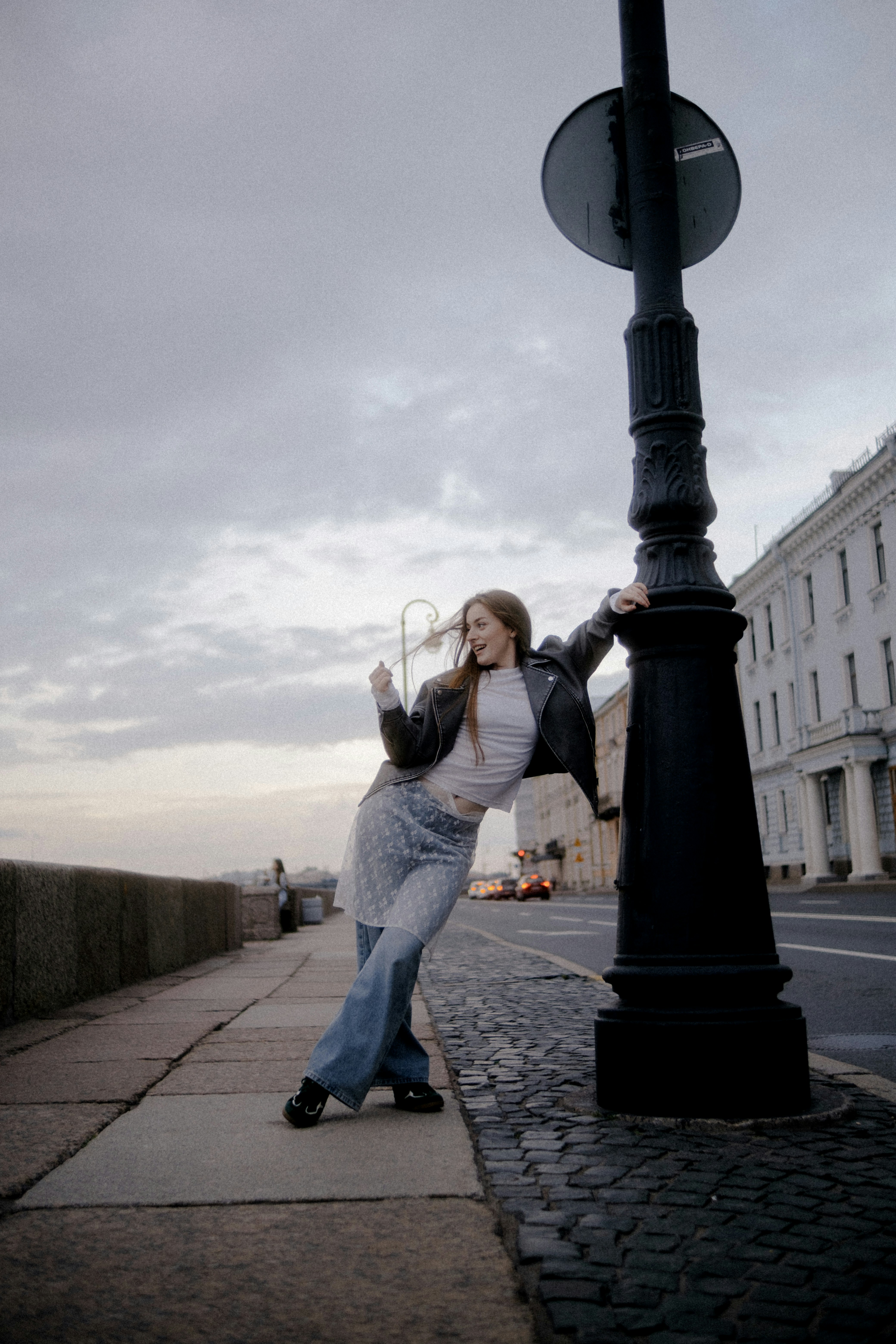 Twilight Lean by the Lamppost: A Cobblestone Promenade Portrait