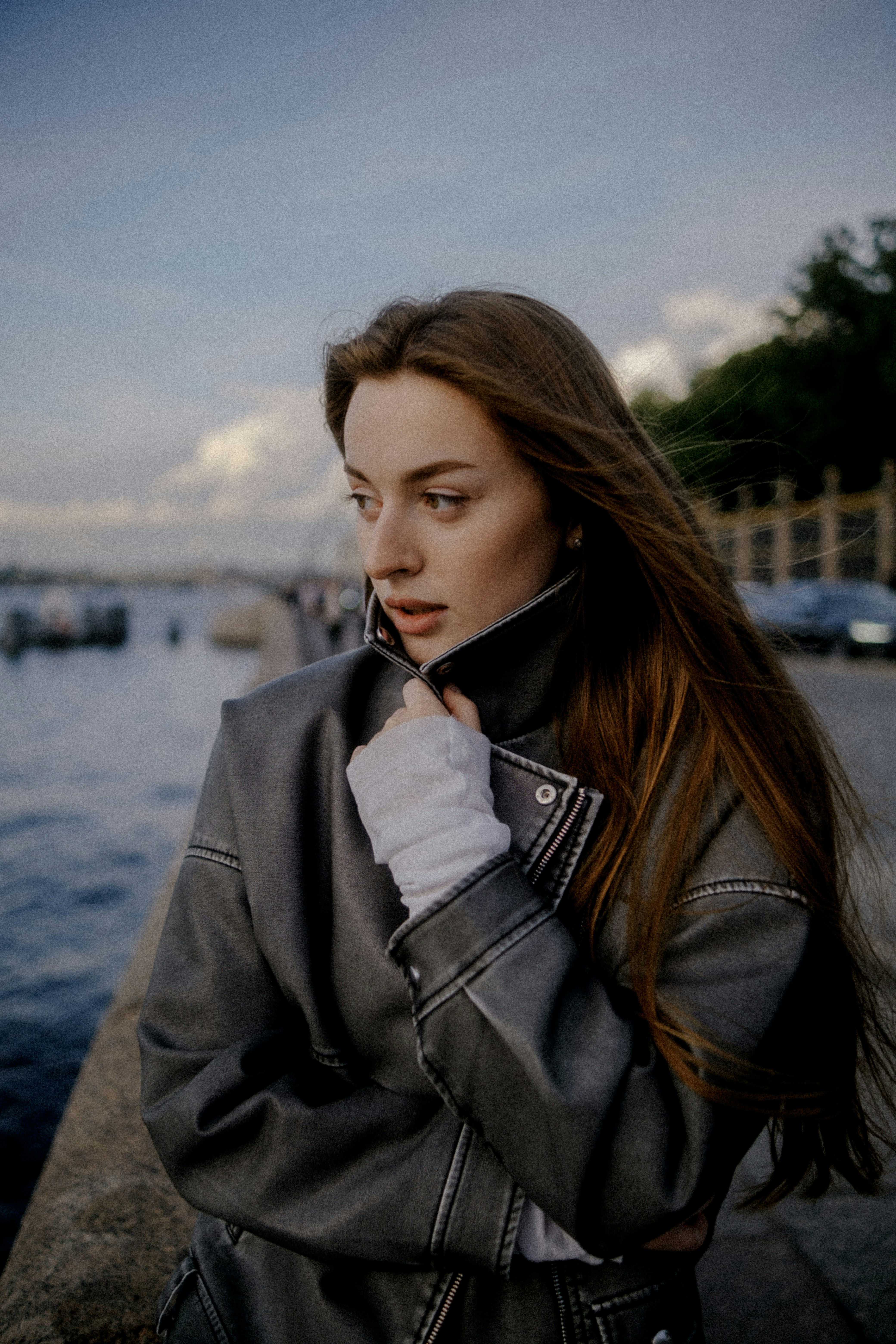 Pierside Dusk: Wind-Touched Portrait at the Waterfront