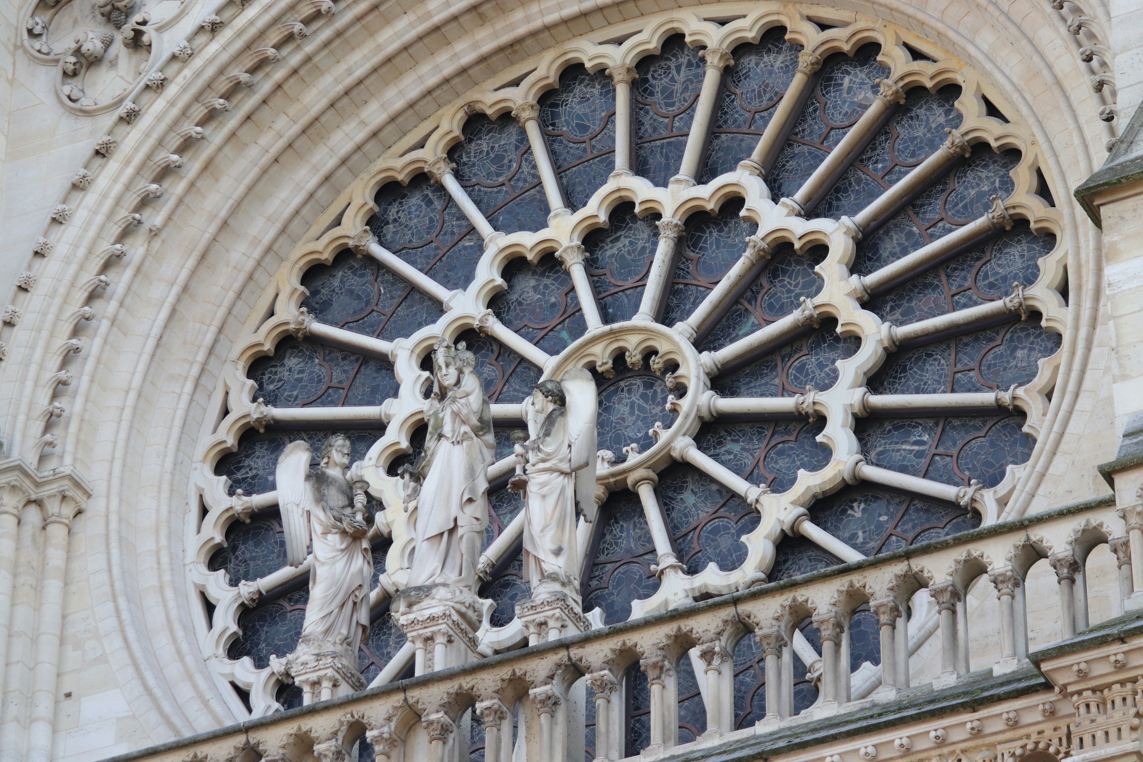 A beautiful cathedral rose window with sculptures. photo – Free Human ...