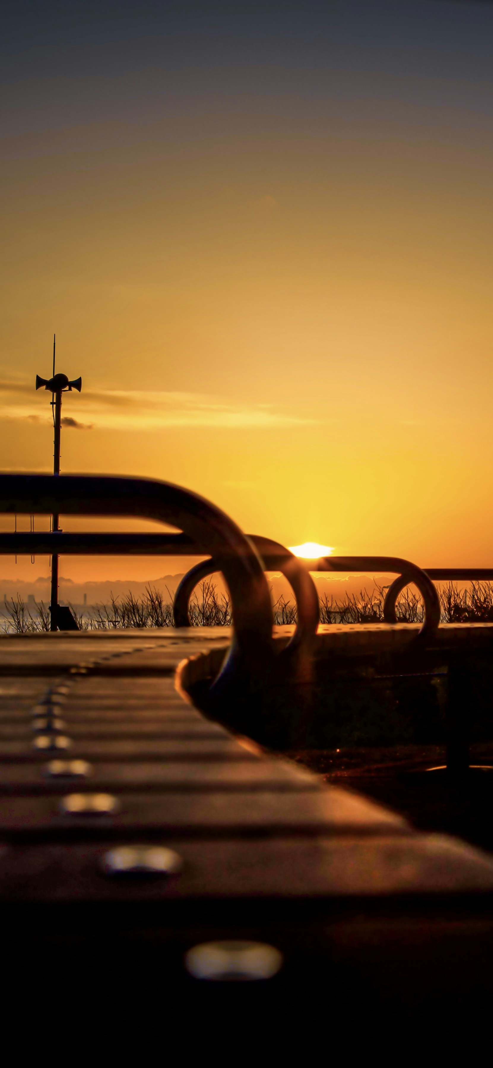 Sunset Railings: A Quiet Pier Woven with Golden Light