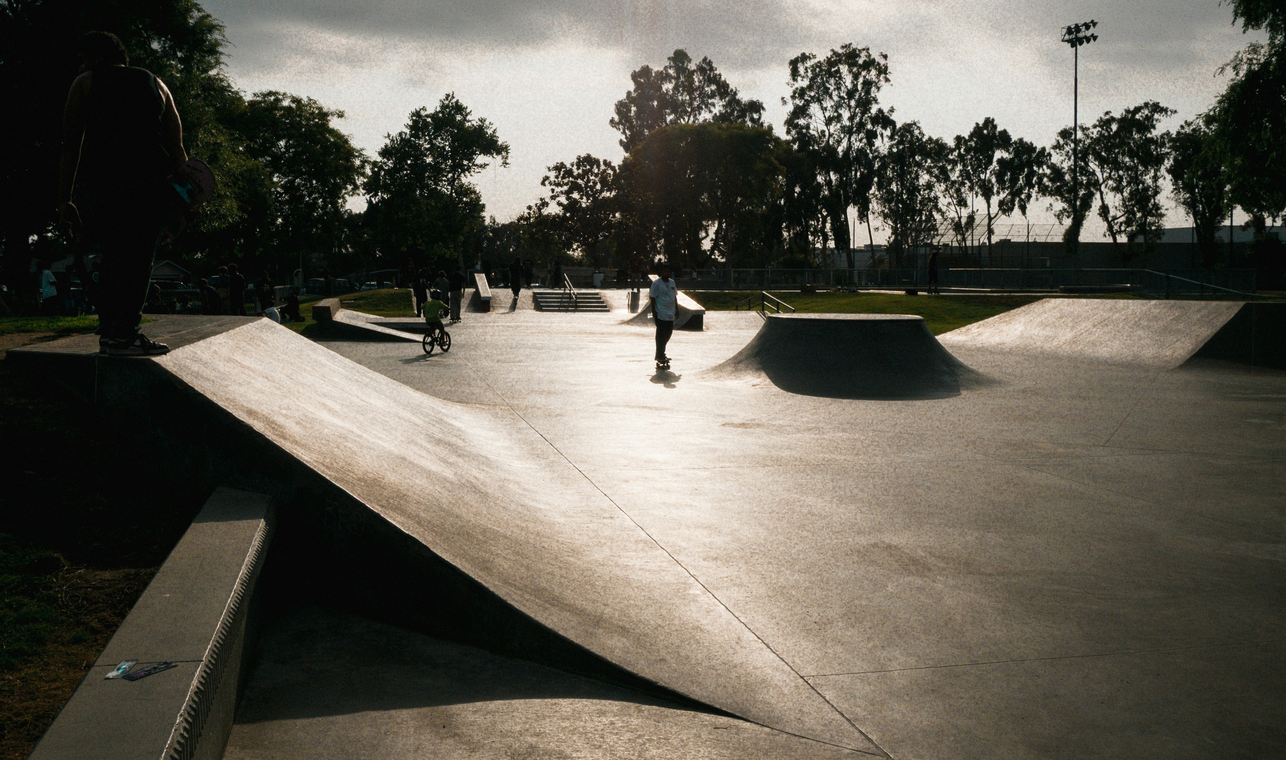 Urban Motion: A Dance of Shadows and Skaters