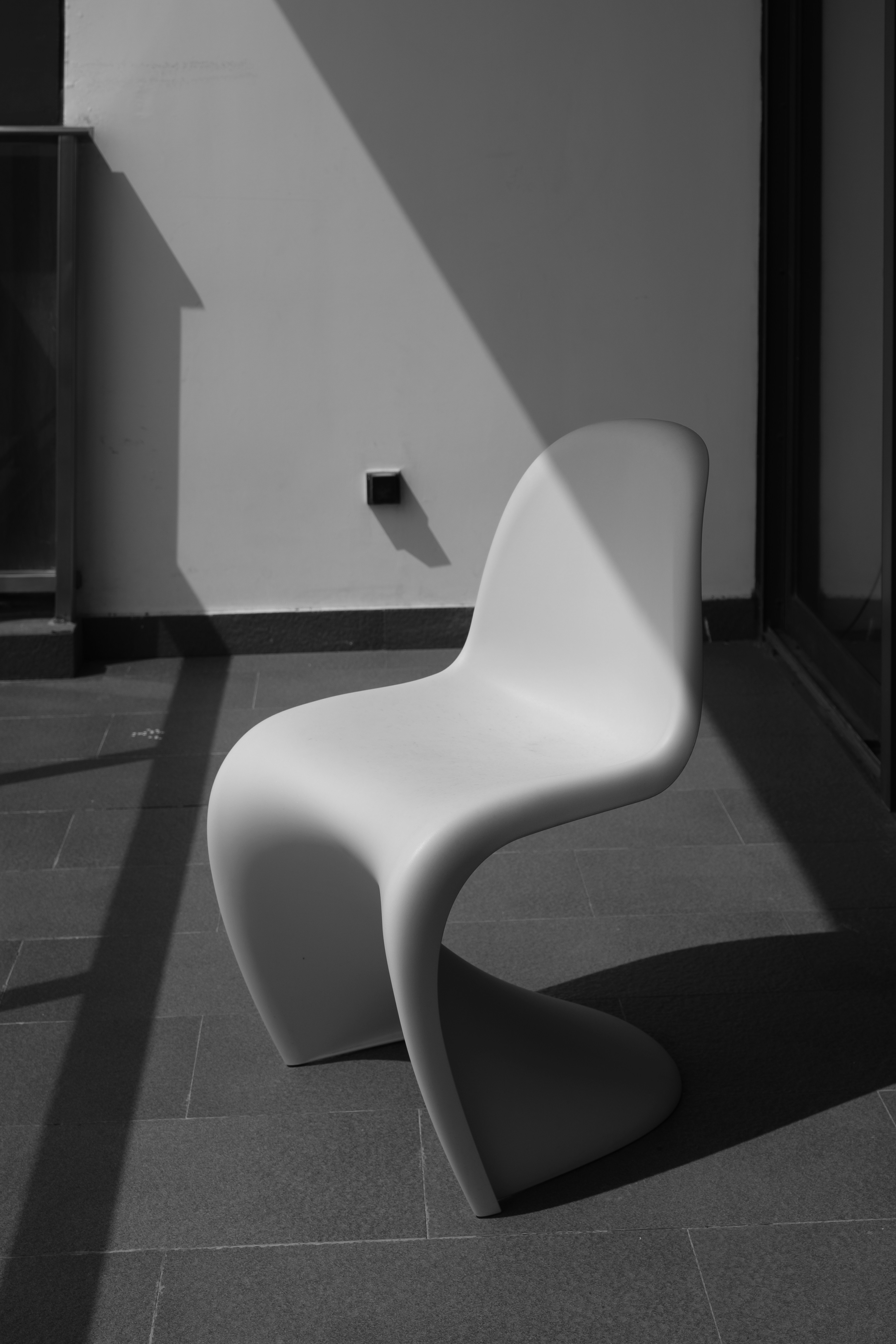 Curves of Minimalism: A Study in Light and Shadow